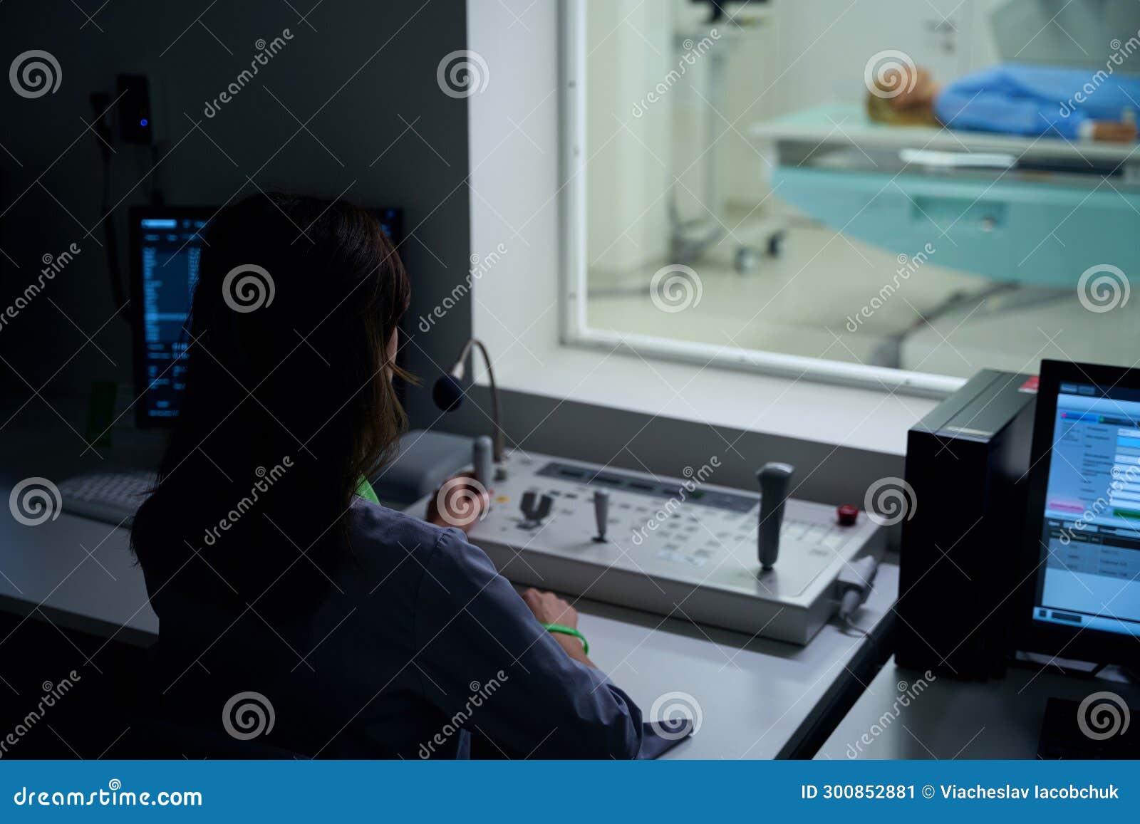 Experienced Radiologic Technologist is Performing X-ray Examination of ...