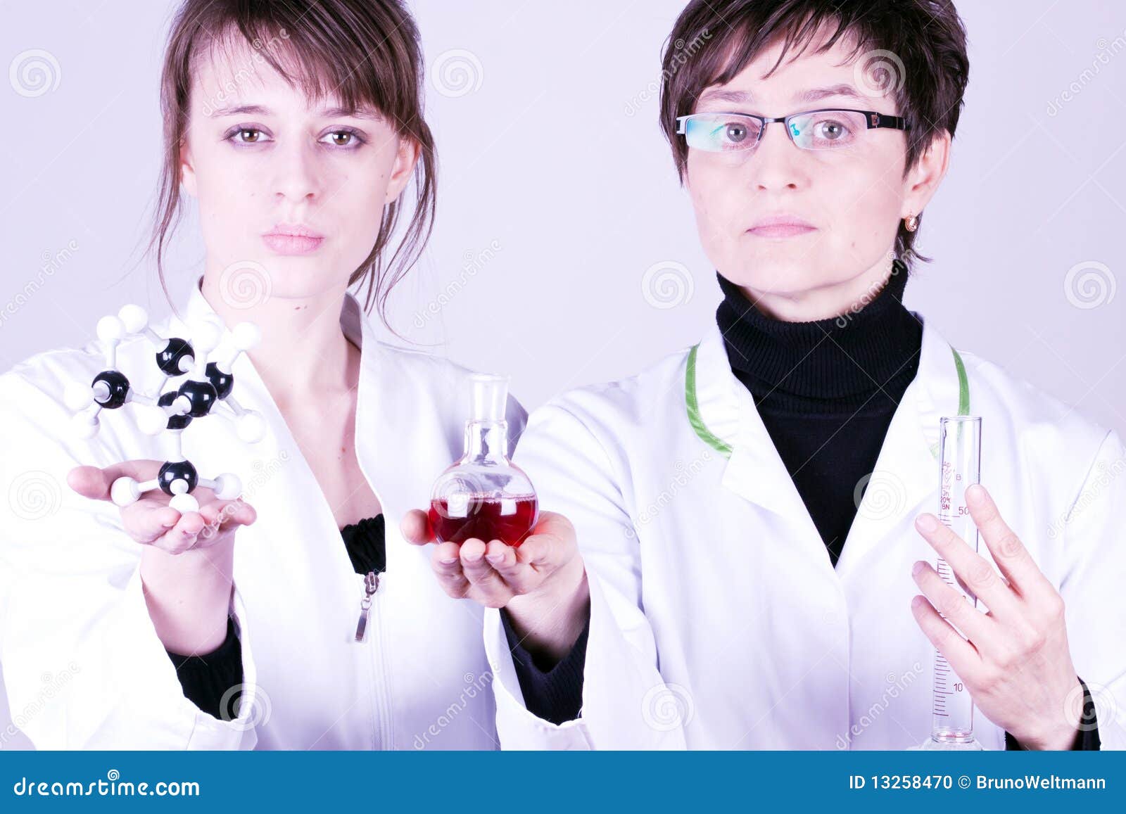 Experienced Scientist and Assistant Stock Photo - Image of assay, atoms ...