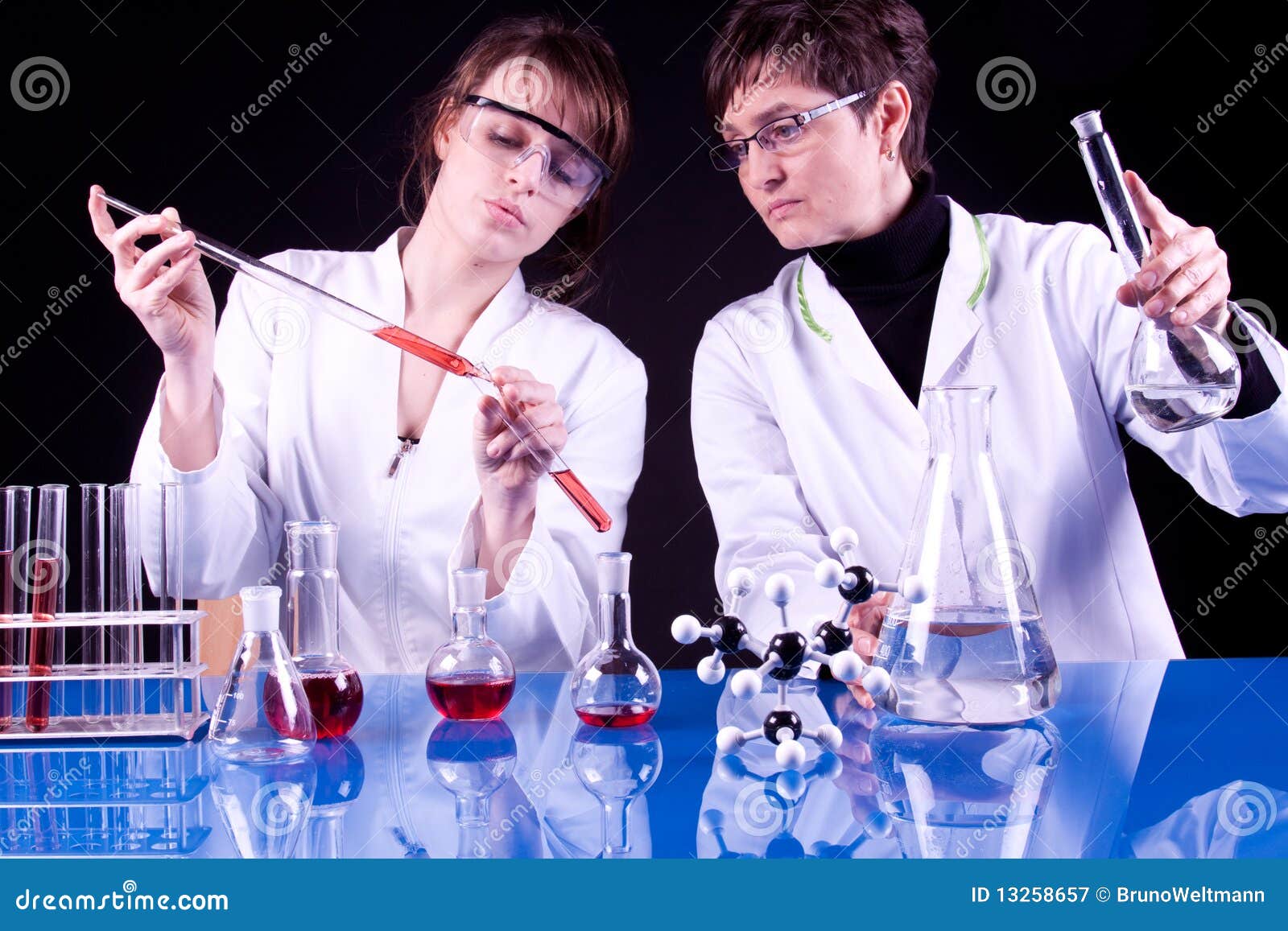 Experienced Scientist and Assistant Stock Image - Image of blue ...