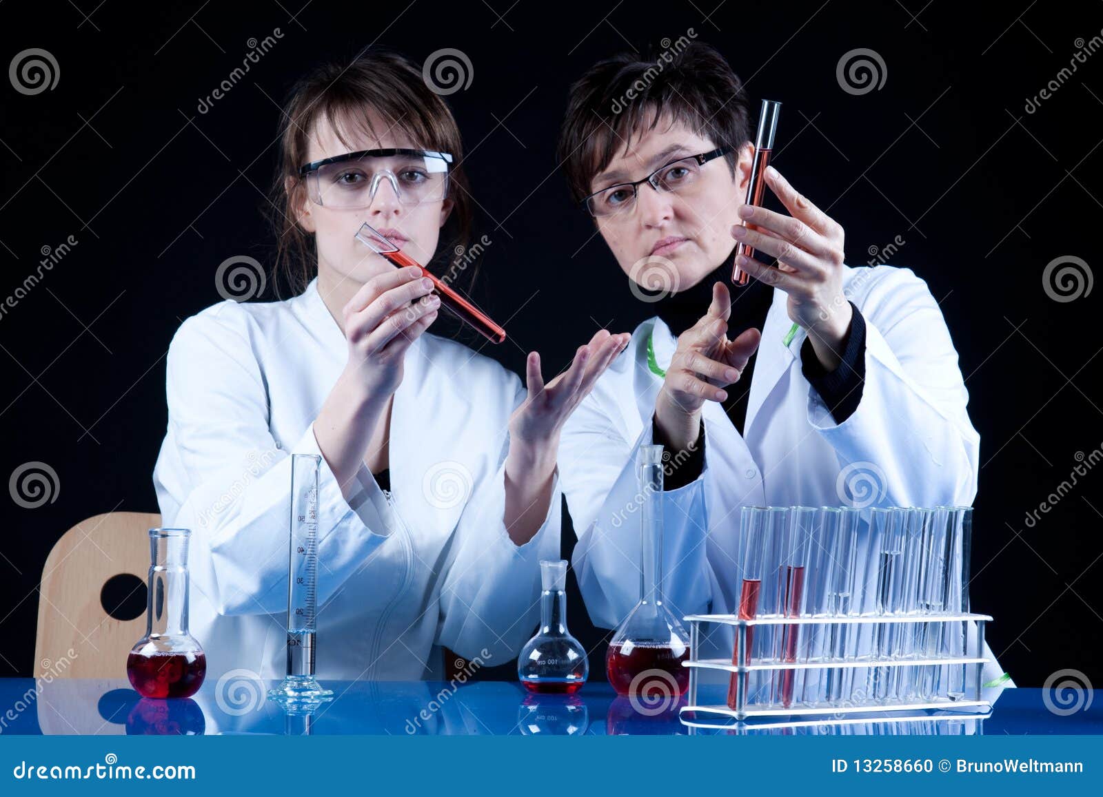 Experienced Scientist and Assistant Stock Photo - Image of experiment ...