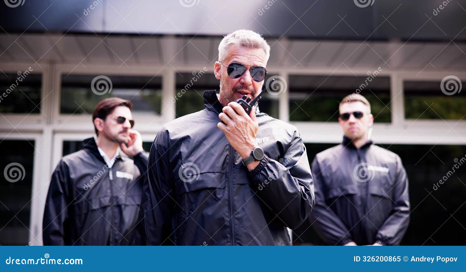 Experienced Security Guard with a Team of Bodyguards Keeping a Close Watch Stock Image - Image ...