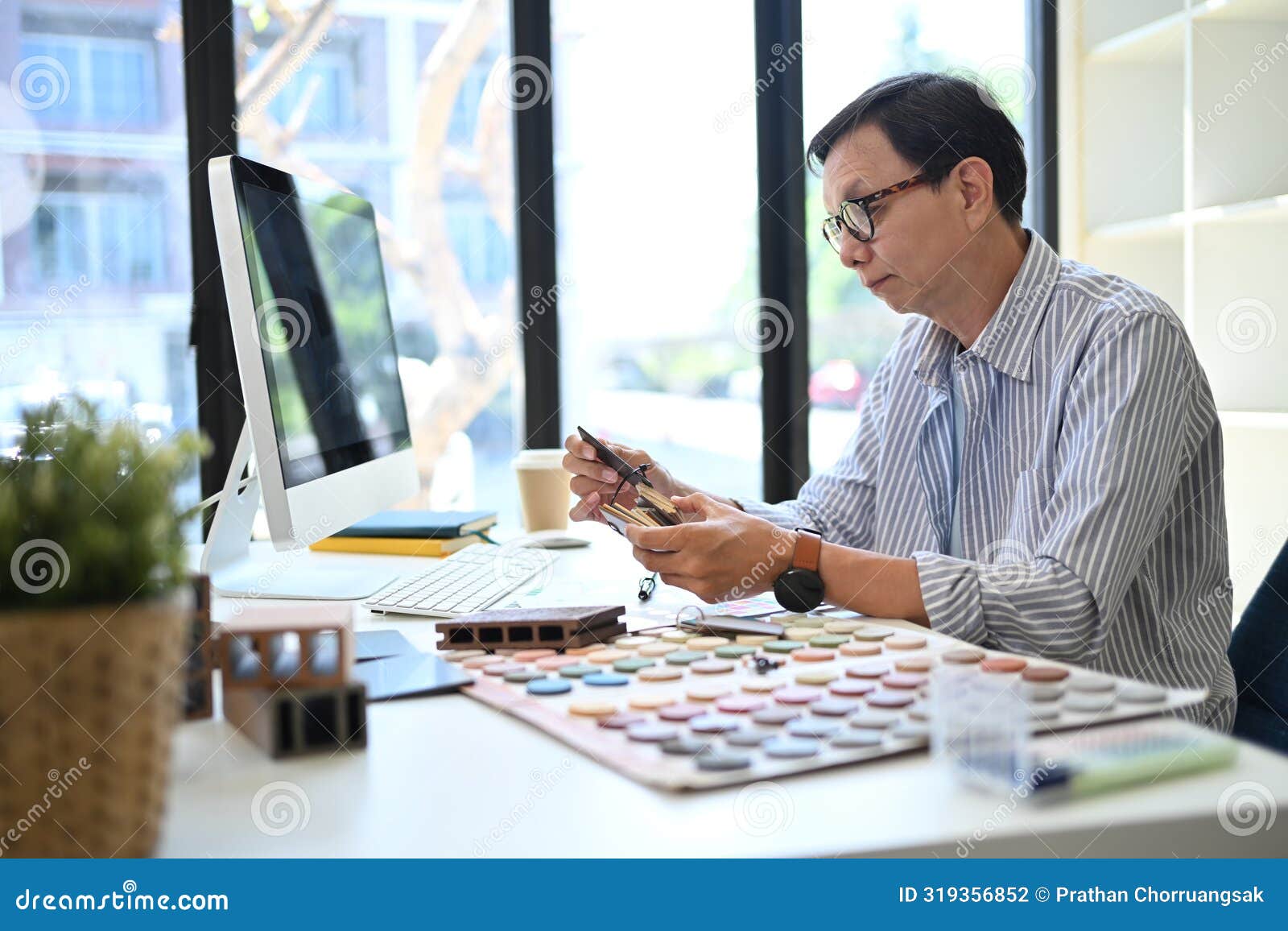 Experienced Senior Interior Designer Working on Project in Modern ...