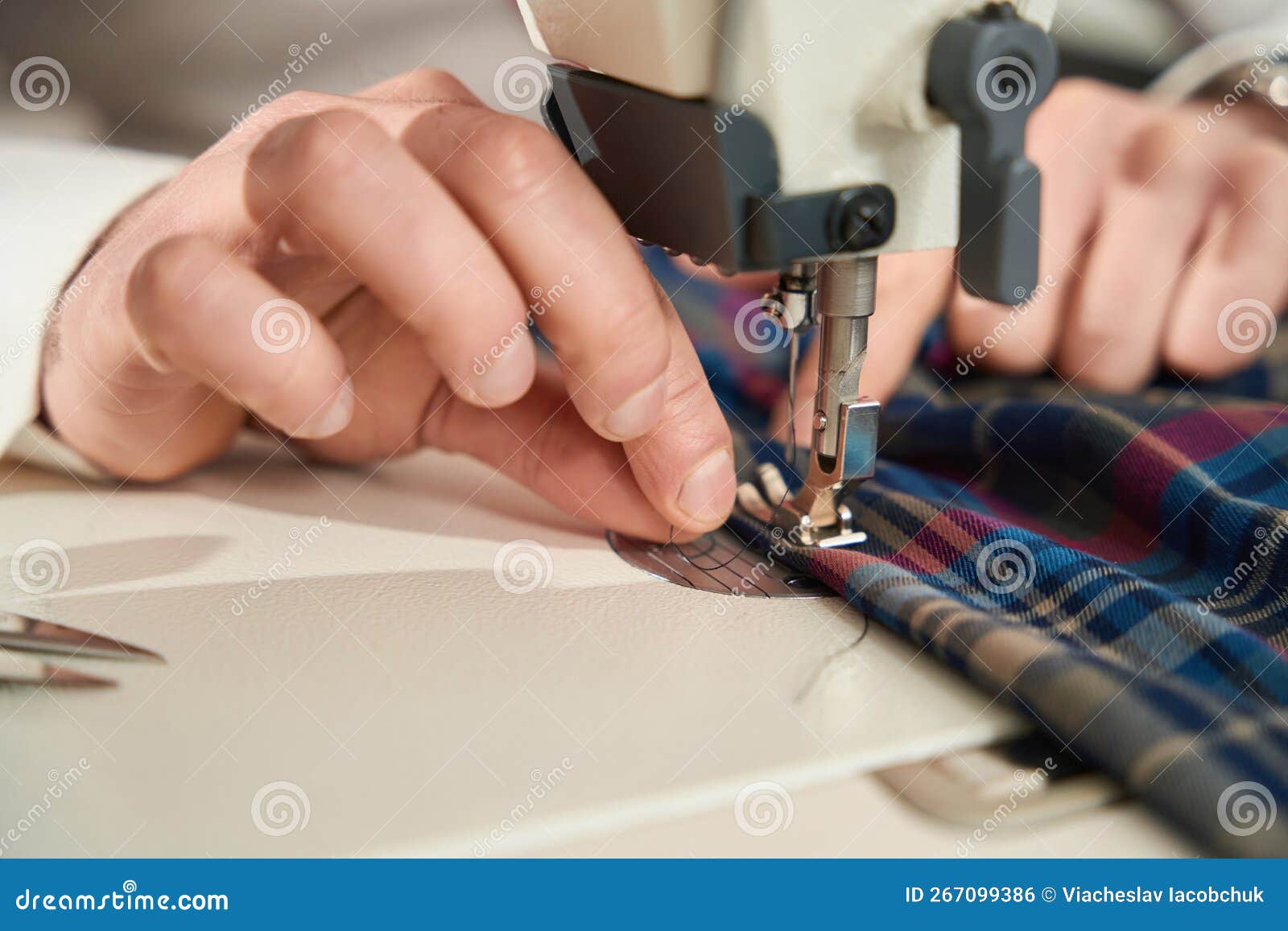 Experienced Tailor is Threading Sewing Machine before Work Stock Photo ...
