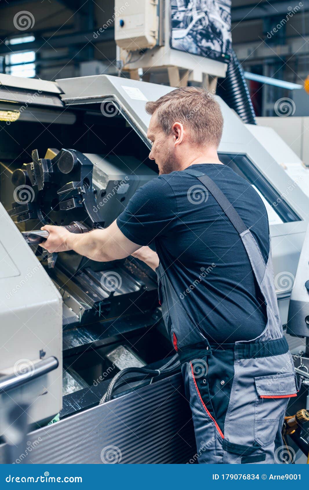 Experienced Worker Changing Tool Setup of Lathe Machine Stock Photo ...