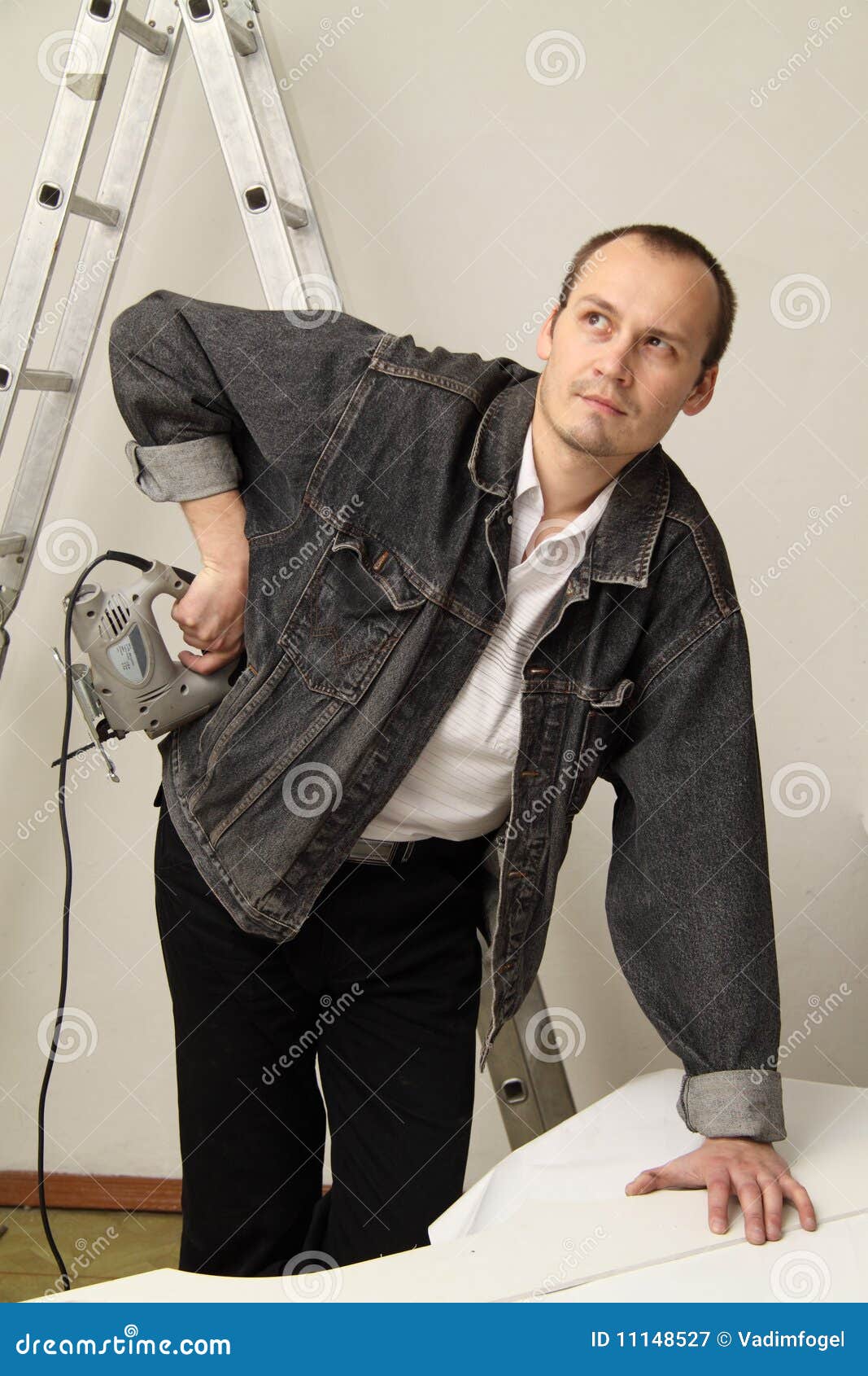 An Experienced Worker Does His Work with Jigsaws Stock Image - Image of ...