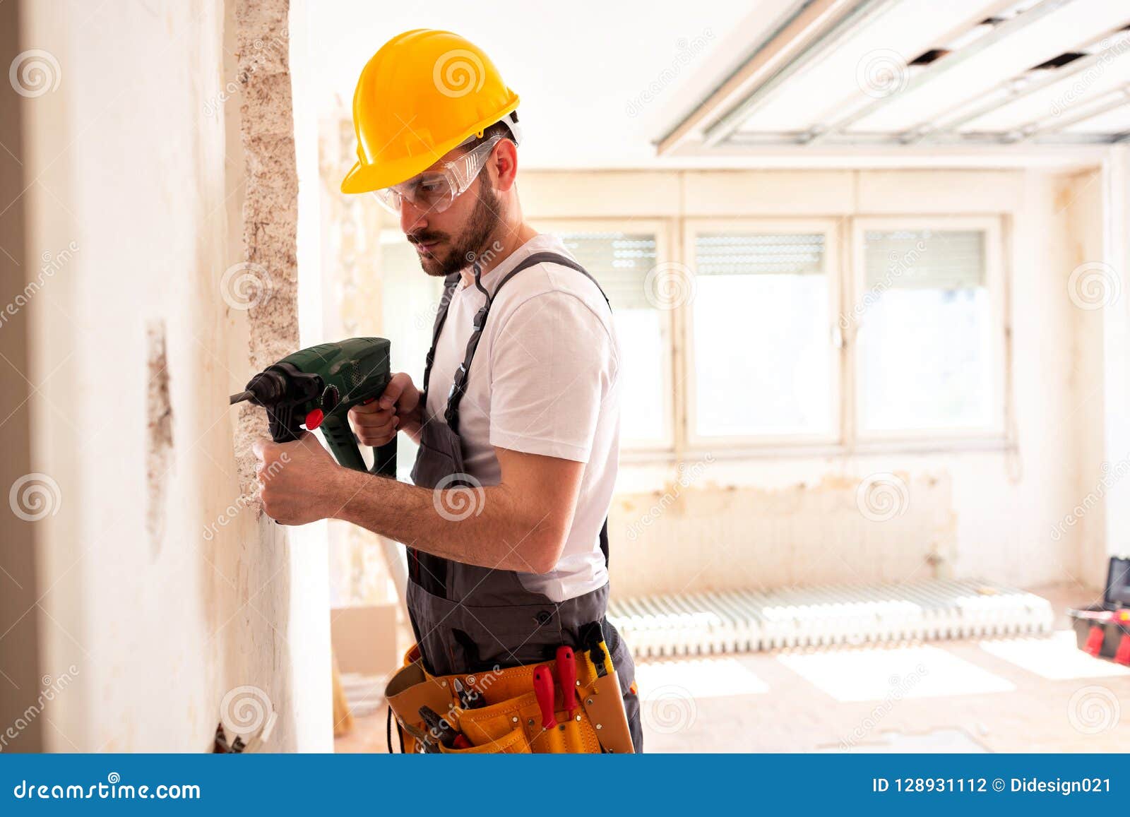 Experienced Worker Using Hammer Drill Stock Photo - Image of gloves ...