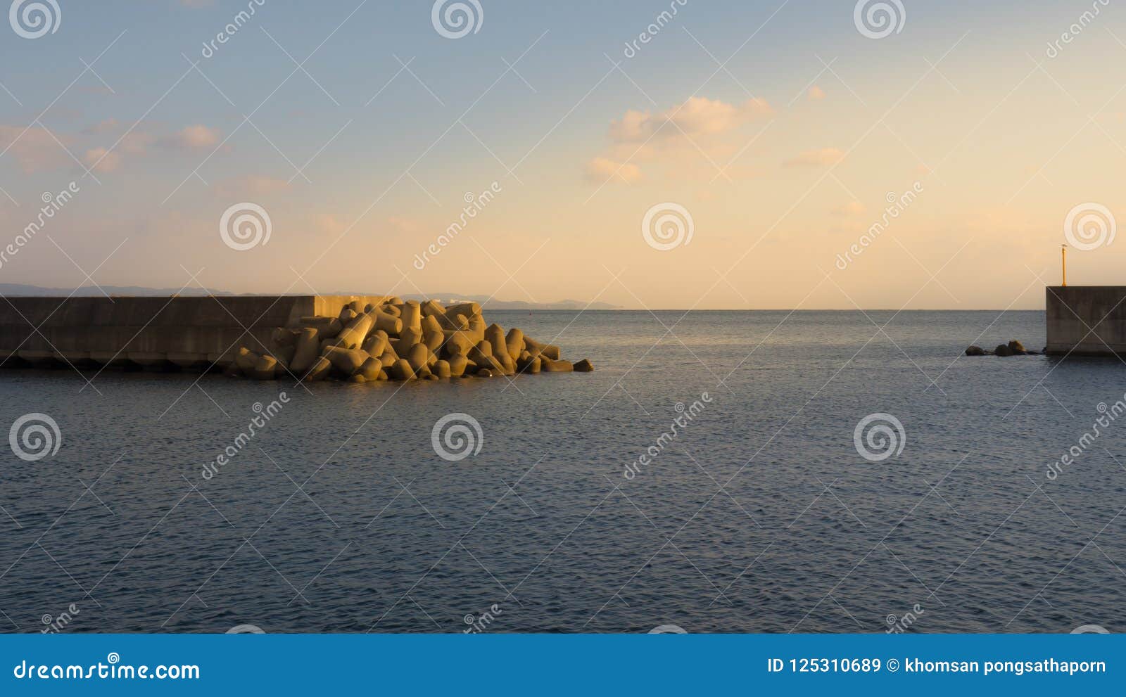 After Tsunami Waves Hit the City, Construction of a Large Wall Was Made ...