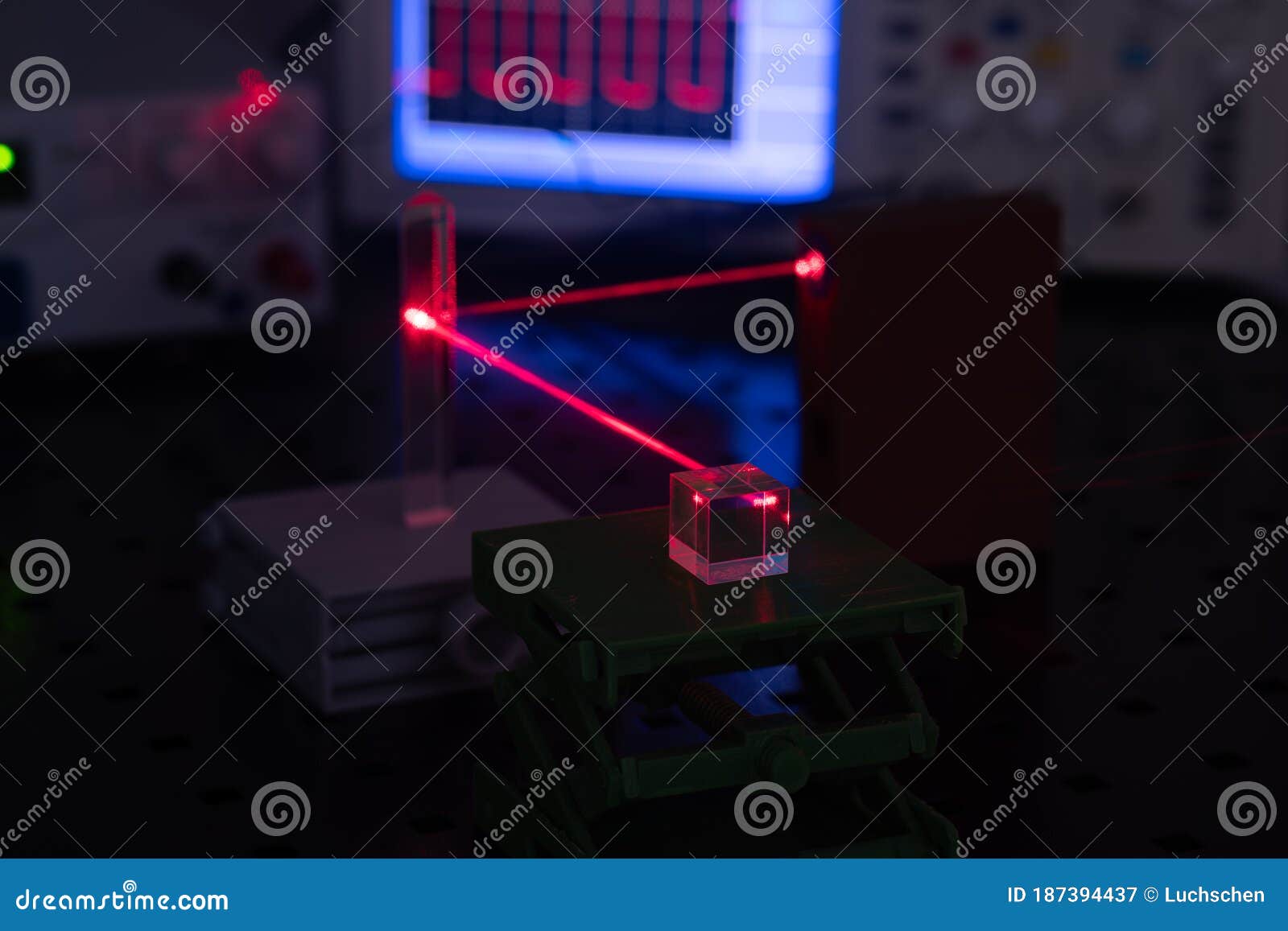 Experiment in Optic Lab with Laser Device. Red Laser on Optical Table ...