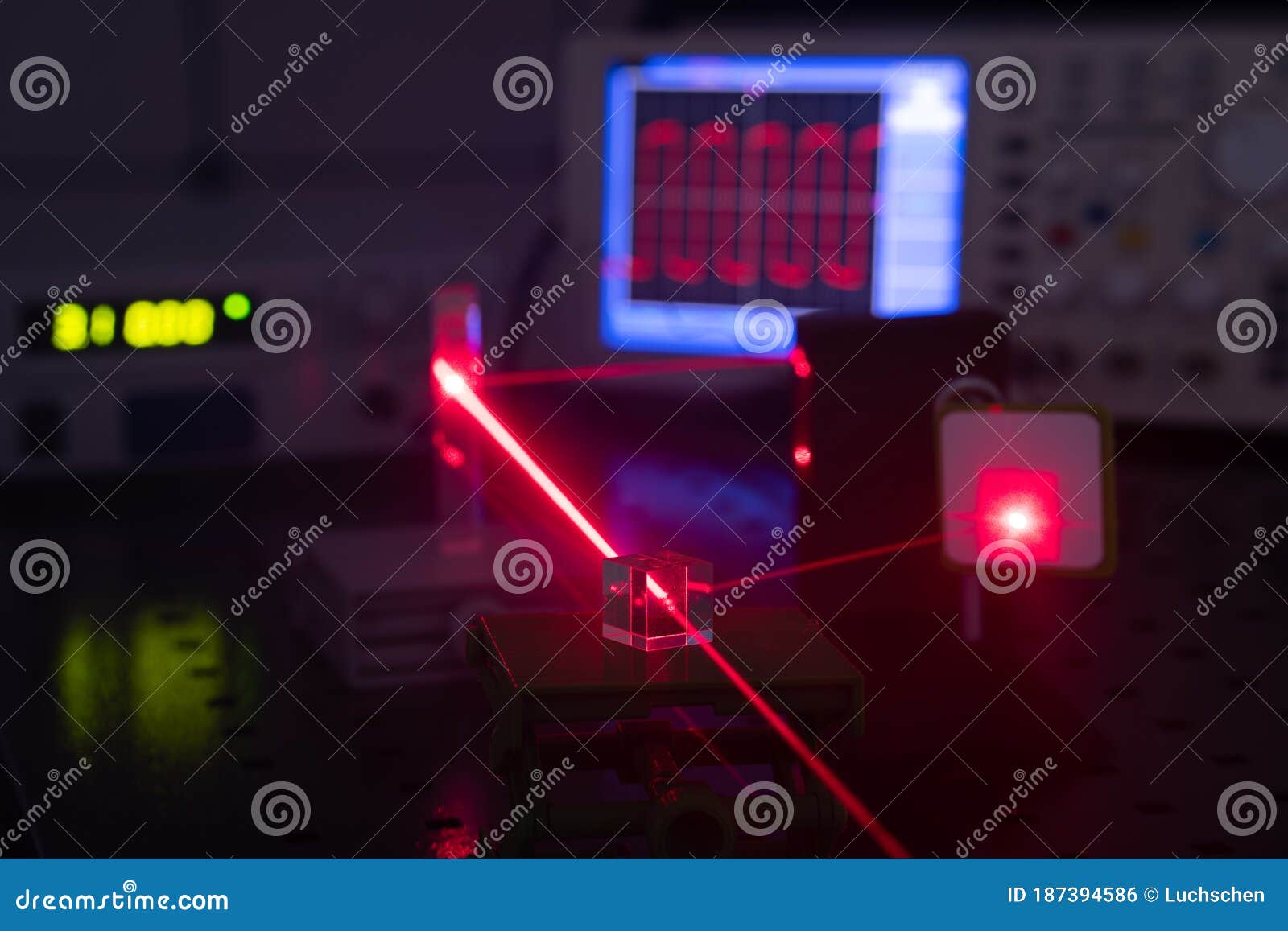 Experiment in Optic Lab with Laser Device. Red Laser on Optical Table ...