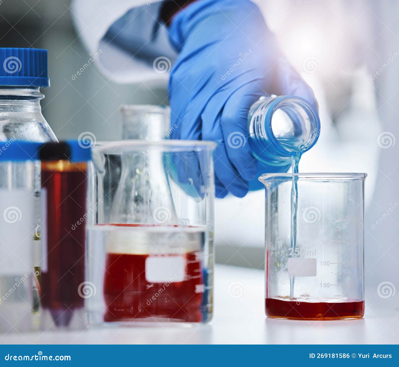 Experimenting with Different Formulas. a Young Female Researcher ...