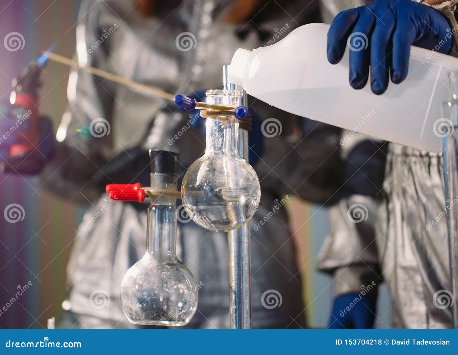 Experiments in a Chemistry Lab. Conducting an Experiment in the ...
