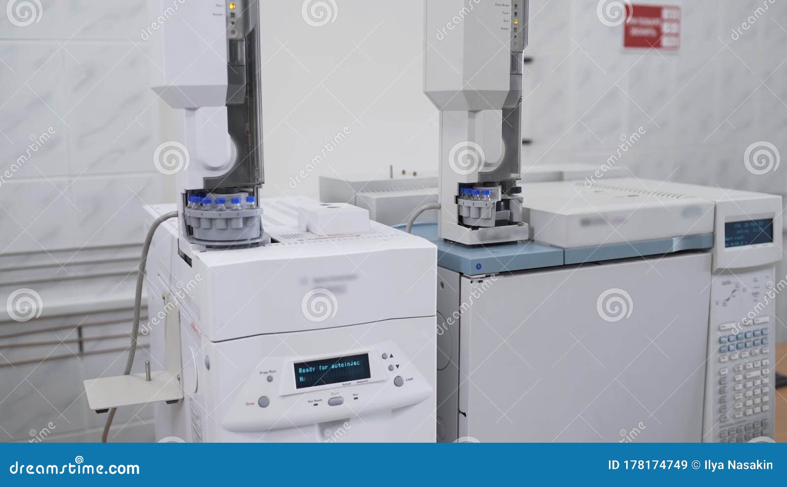 Automated Laboratory Machine for Research Scientist Analyzes Test Tube ...