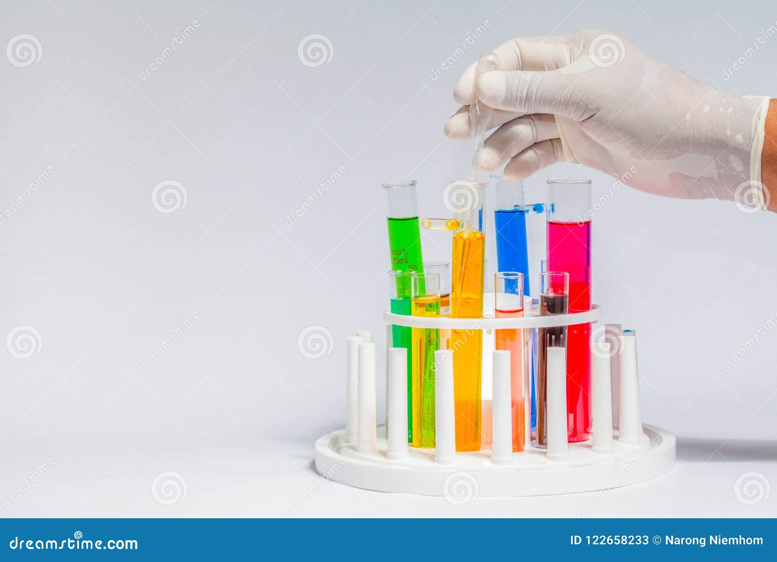 Experiments In Mixing Chemical Substances Into Glass Tubes Royalty-Free ...