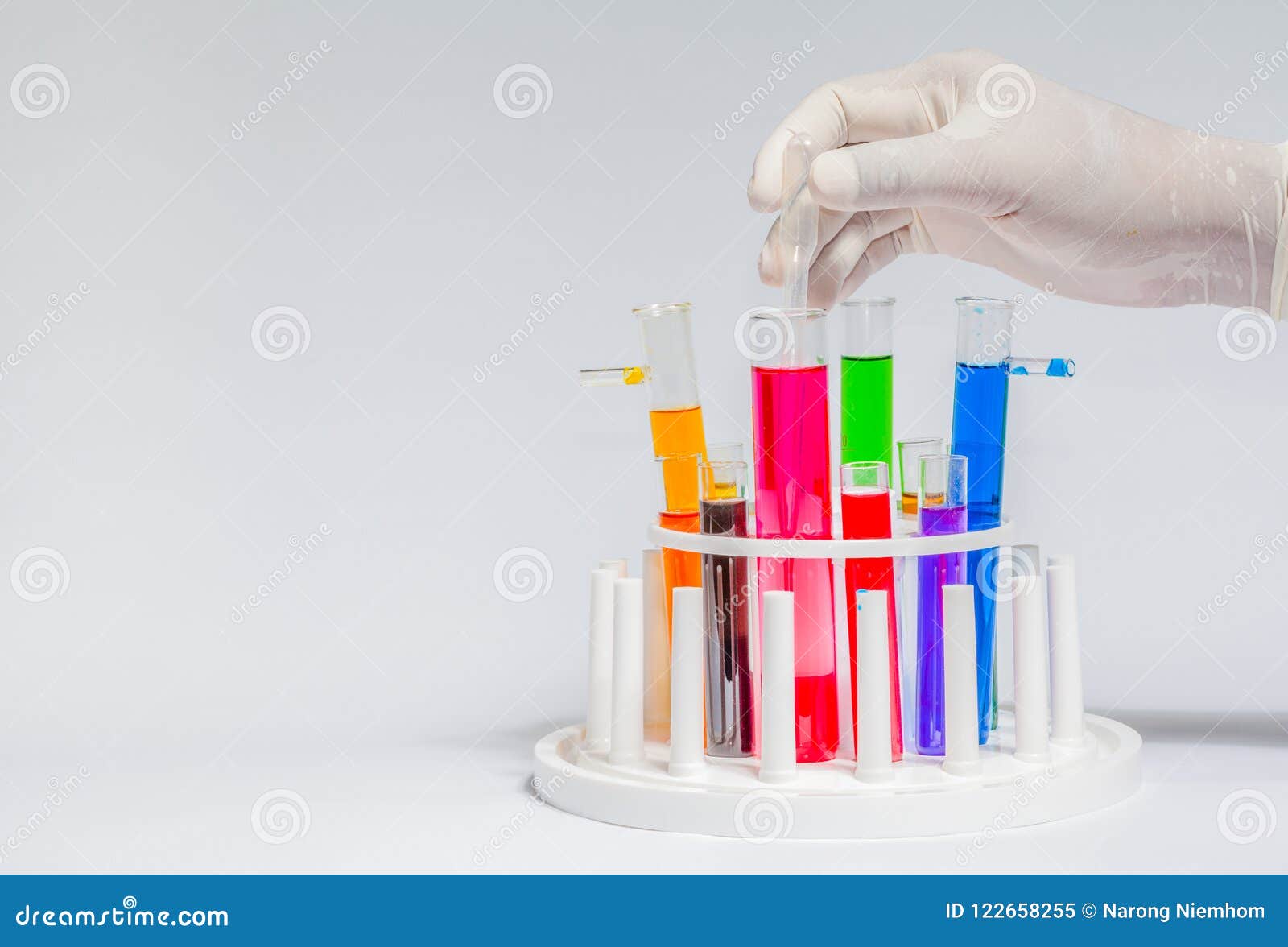 Experiments In Mixing Chemical Substances Into Glass Tubes Royalty-Free ...