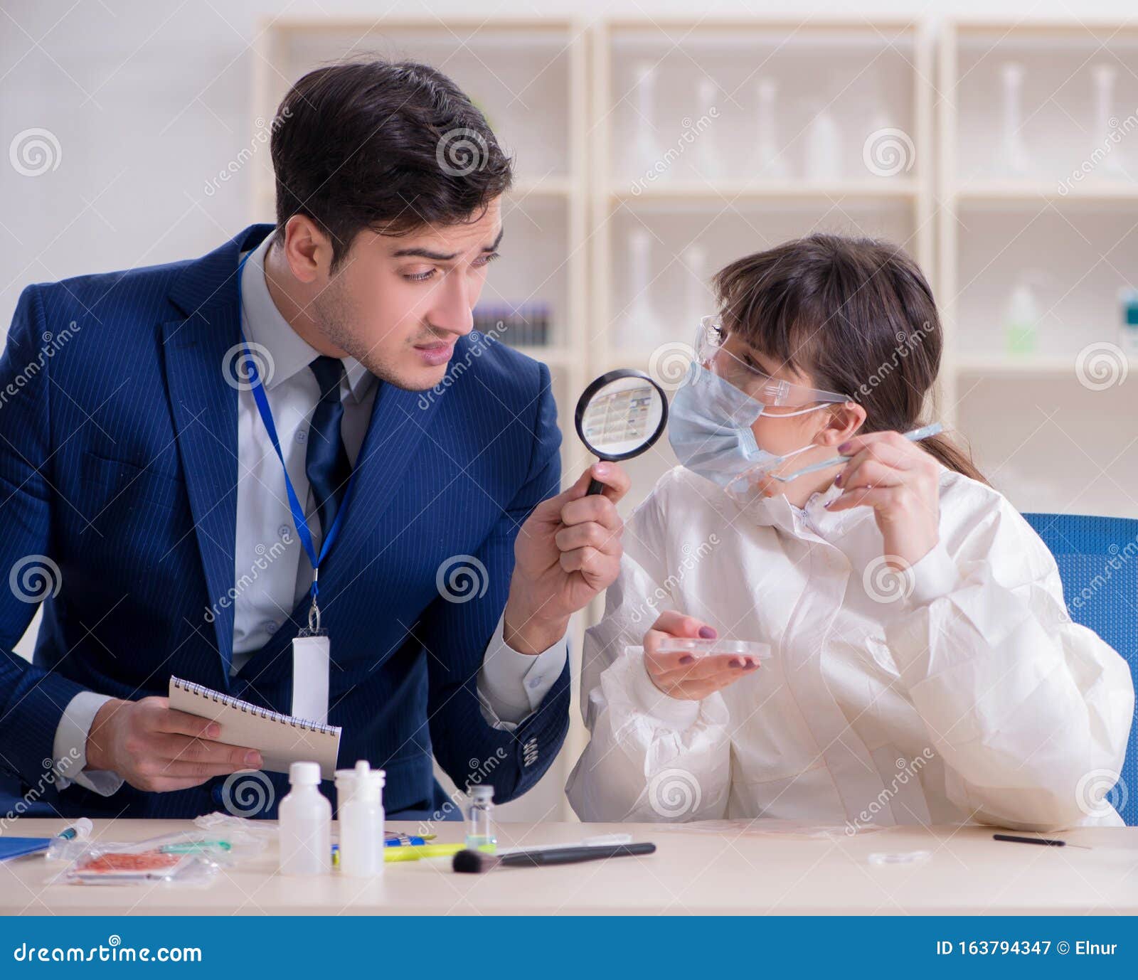 Expert Criminologist Working in the Lab for Evidence Stock Image ...