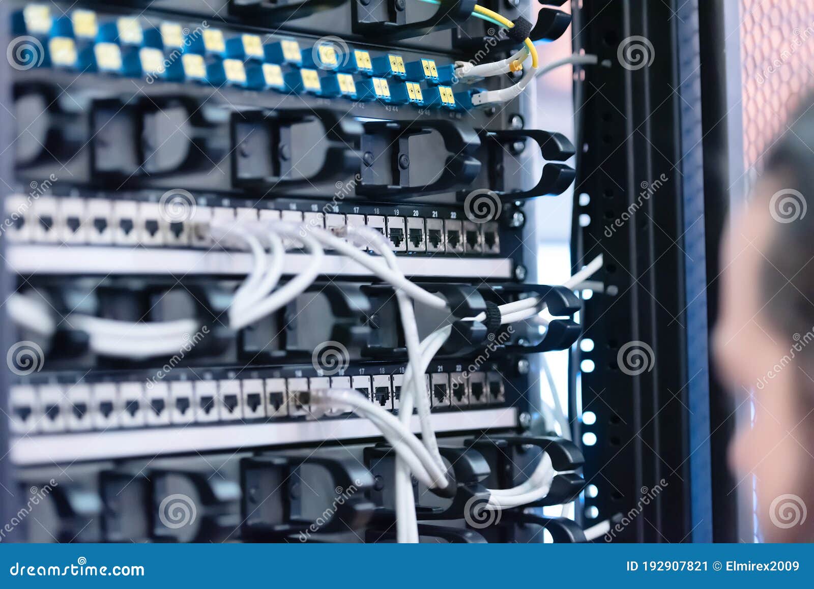 An Expert Engeneer In Datacenter Server Room Connecting Cables In ...