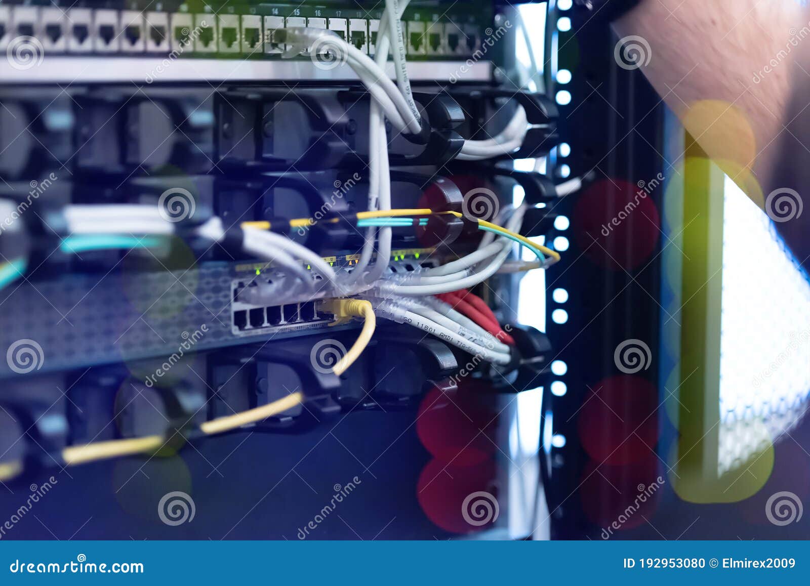 An Expert Engeneer In Datacenter Server Room Connecting Cables In ...