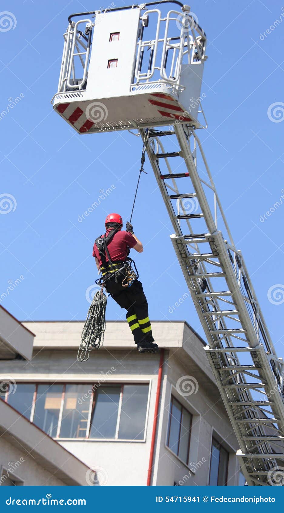 Expert Firefighter Down with the Rope in the Building Stock Image ...