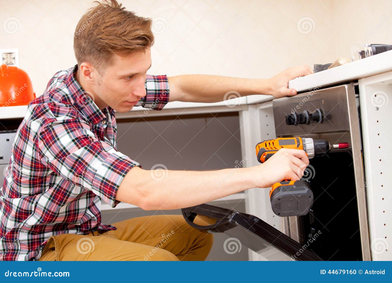 Expert Panel Fixing the Kitchen Oven Stock Photo - Image of repair ...