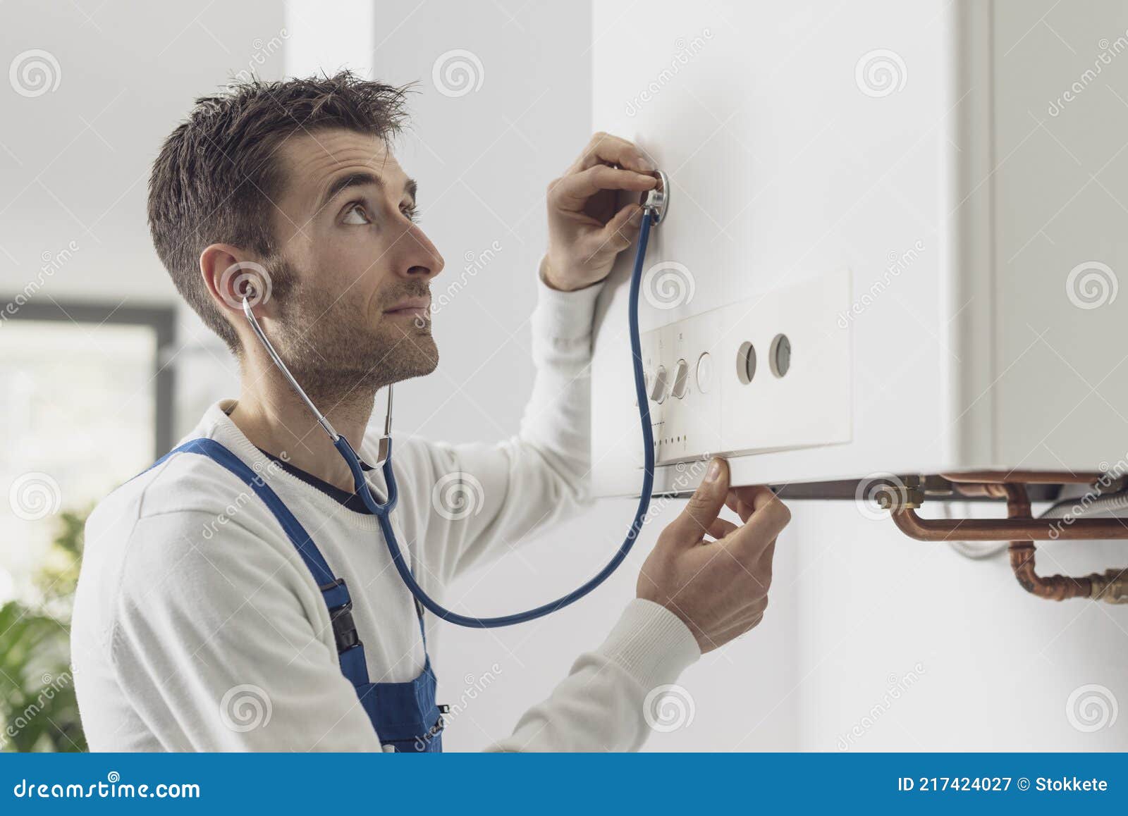 Expert Plumber Checking the Boiler with a Stethoscope Stock Image ...