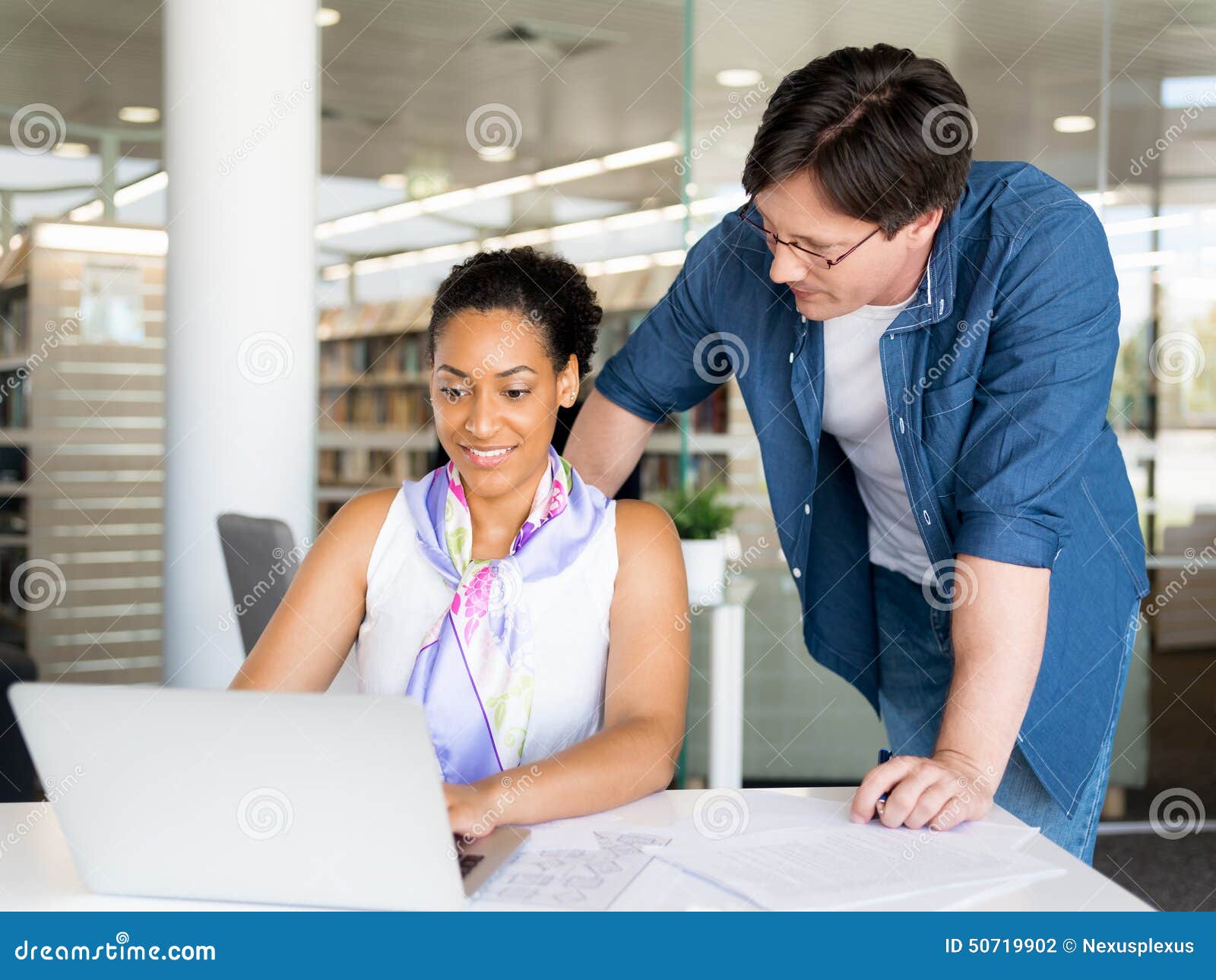 Expert is Ready To Help Her with Her Work Stock Photo - Image of ...