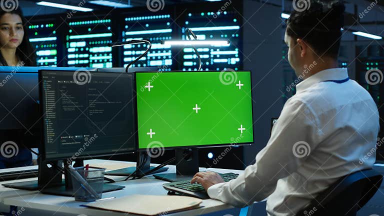 It Expert in Server Room Tracking Network Traffic with Chroma Key PC ...