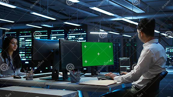 Expert Updating Server Room Systems Using Green Screen Computer Stock Image - Image of updating ...