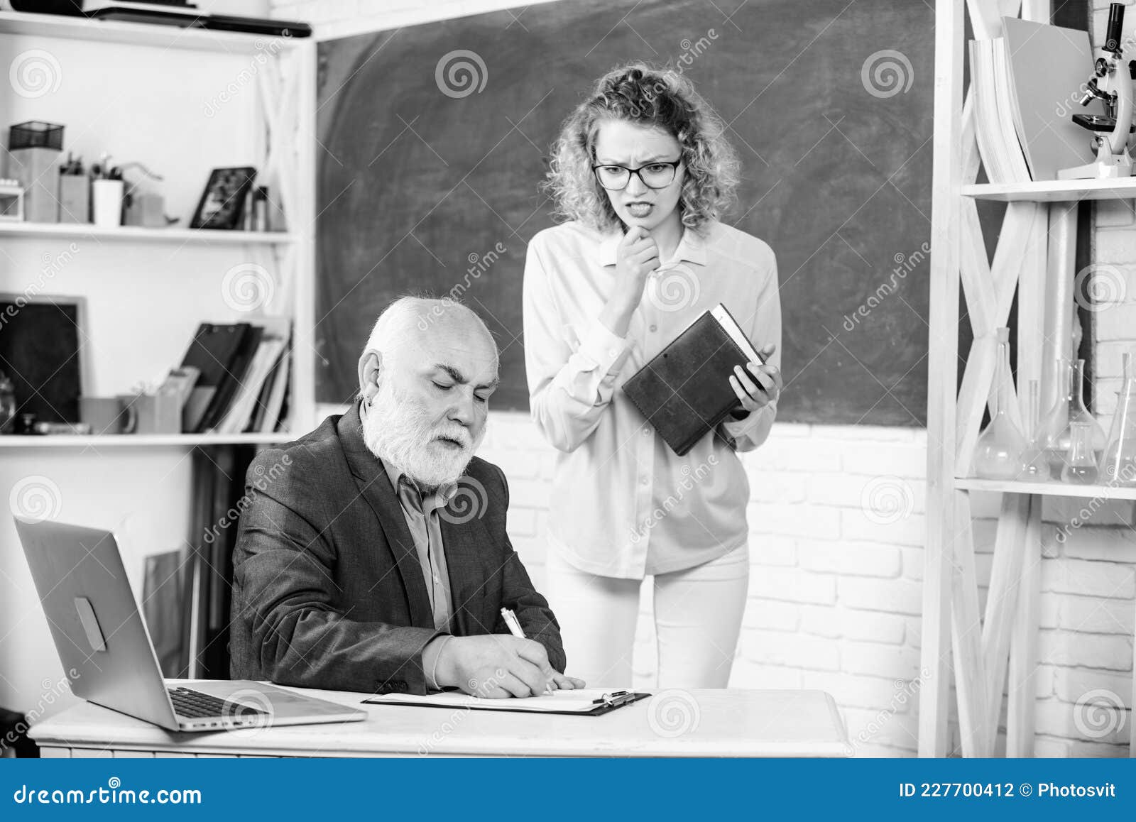 Explaining Difficult Topic. Student Puzzled by Some Information. School ...