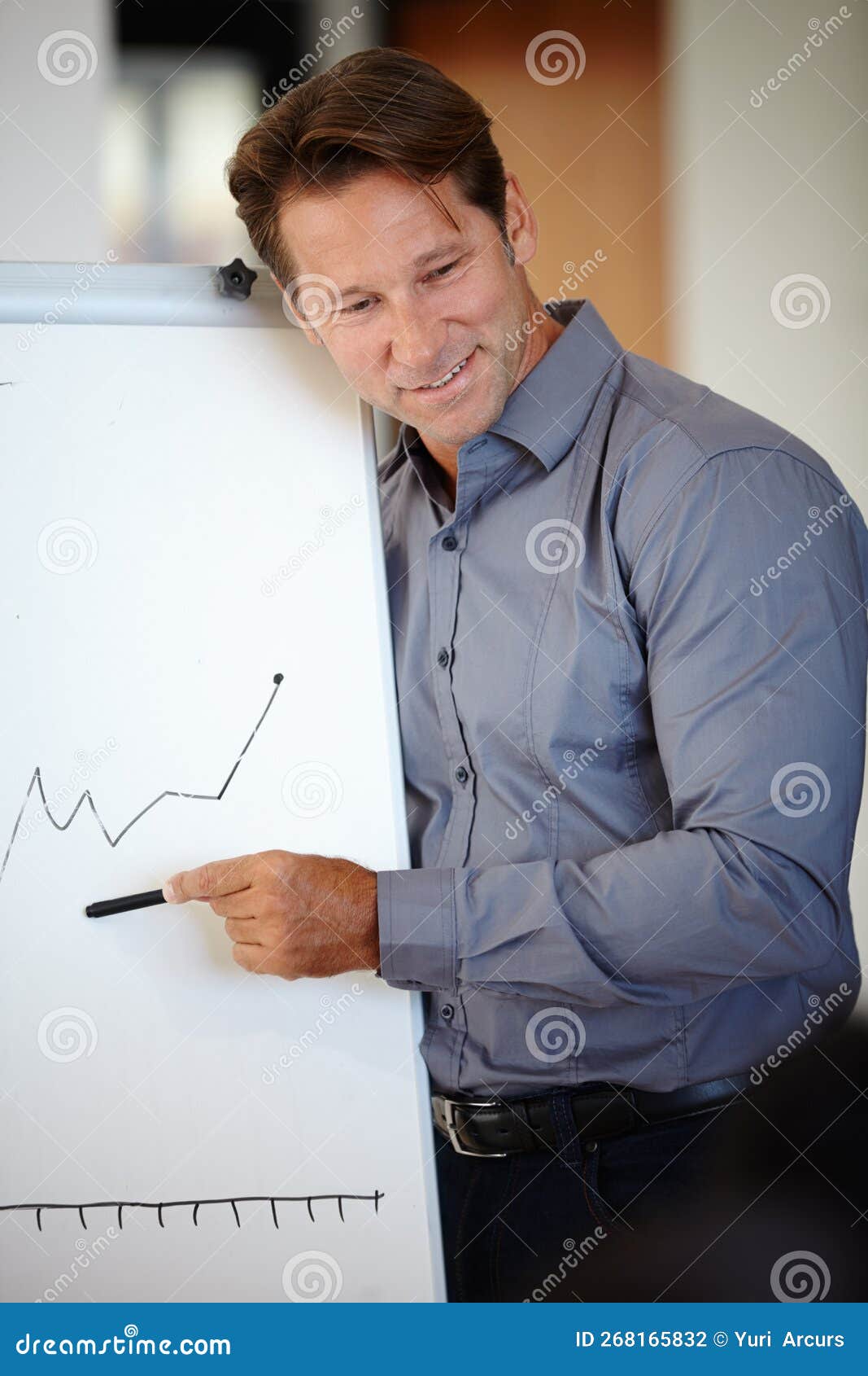 Explaining the Meaning of the Data. a Man Doing a Presentation with a ...