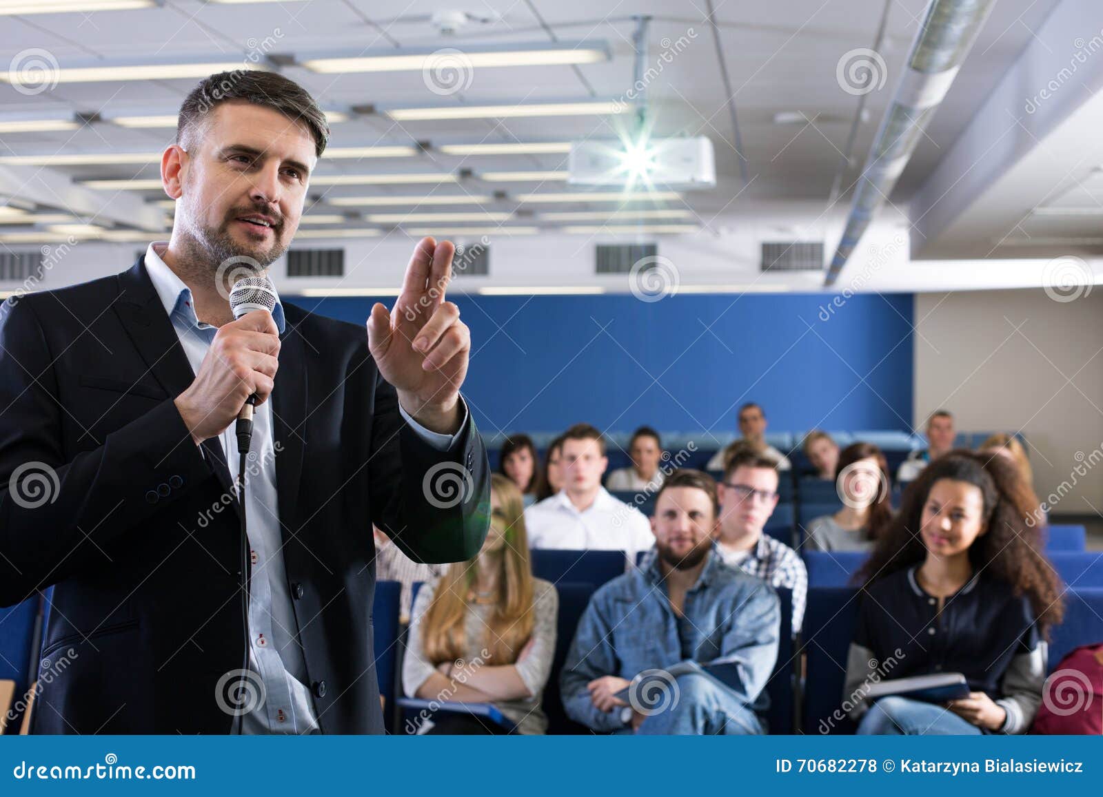 Explaining a new topic stock photo. Image of lecture - 70682278
