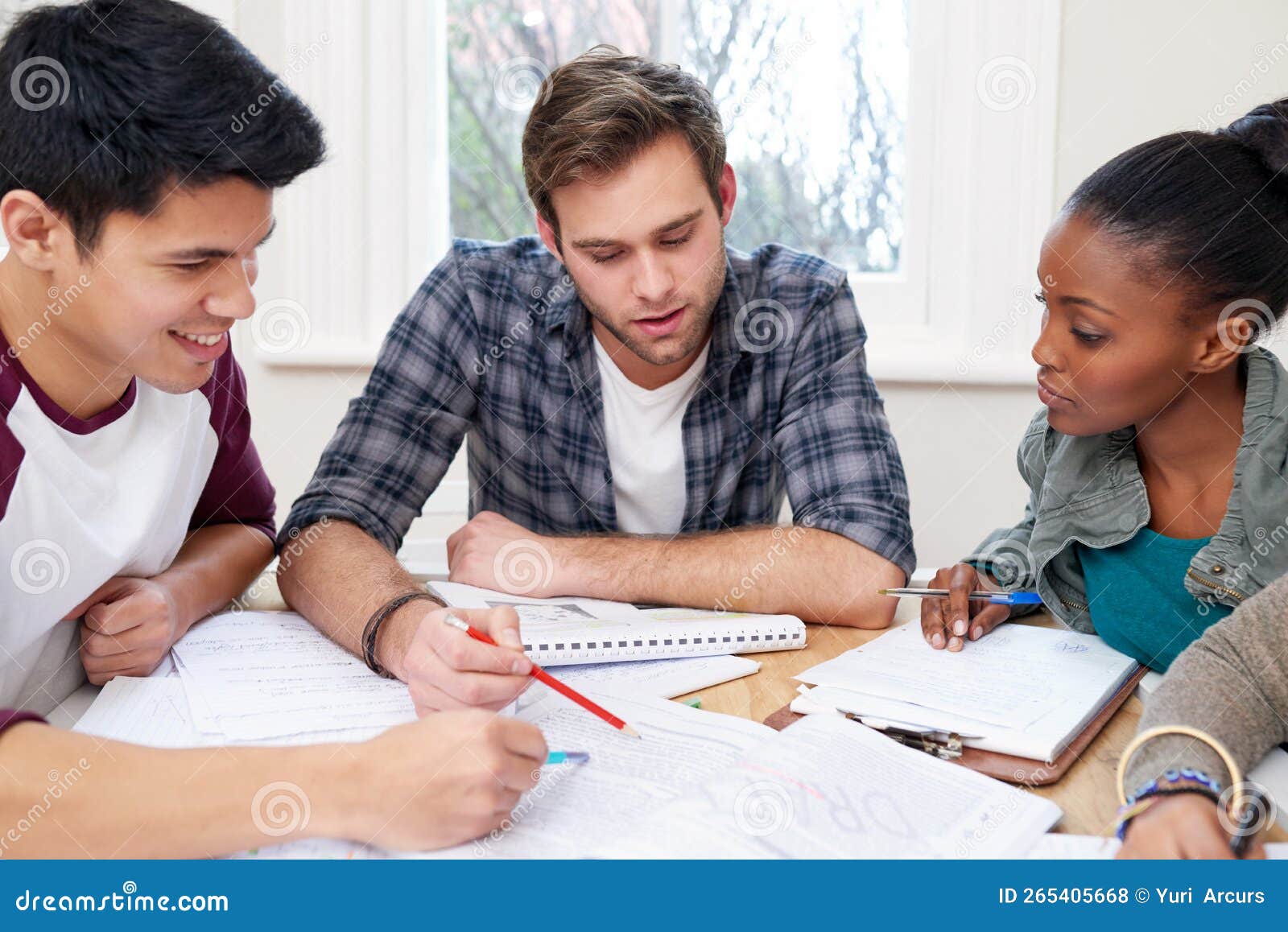 Explainng the Formula. Three University Students Studying. Stock Photo ...