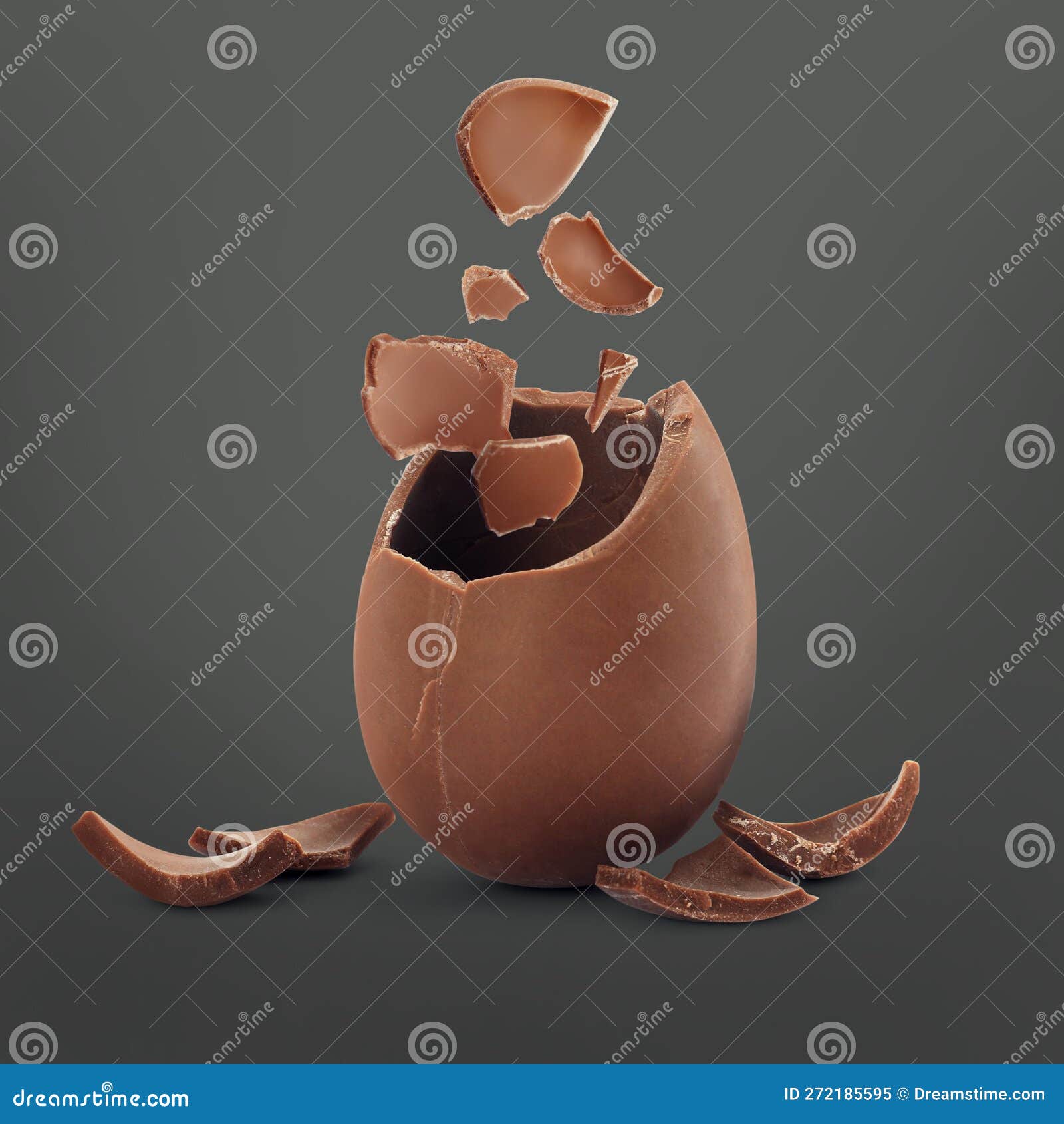 Exploded Milk Chocolate Egg on Dark Grey Background Stock Image - Image ...