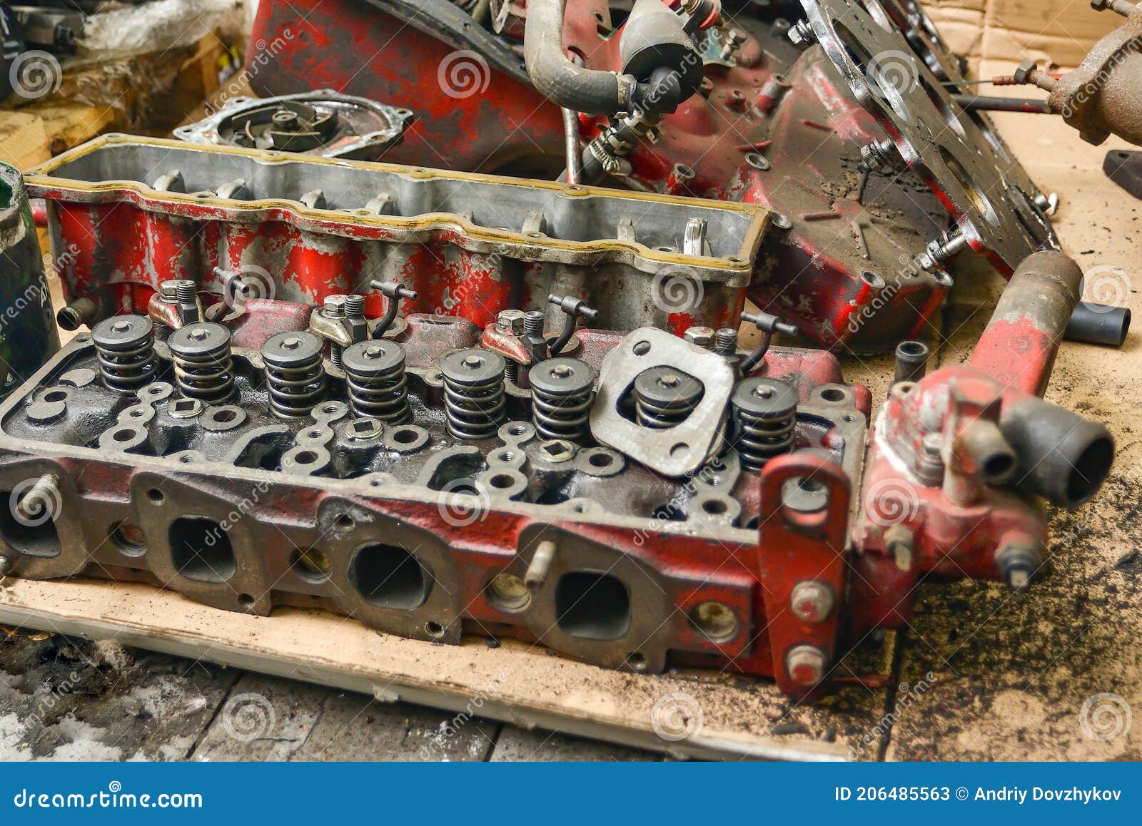 Exploded View of the Cylinder Head of a Four-cylinder Engine Being ... Exploded View of the Cylinder Head of a Four-cylinder Engine Being ...