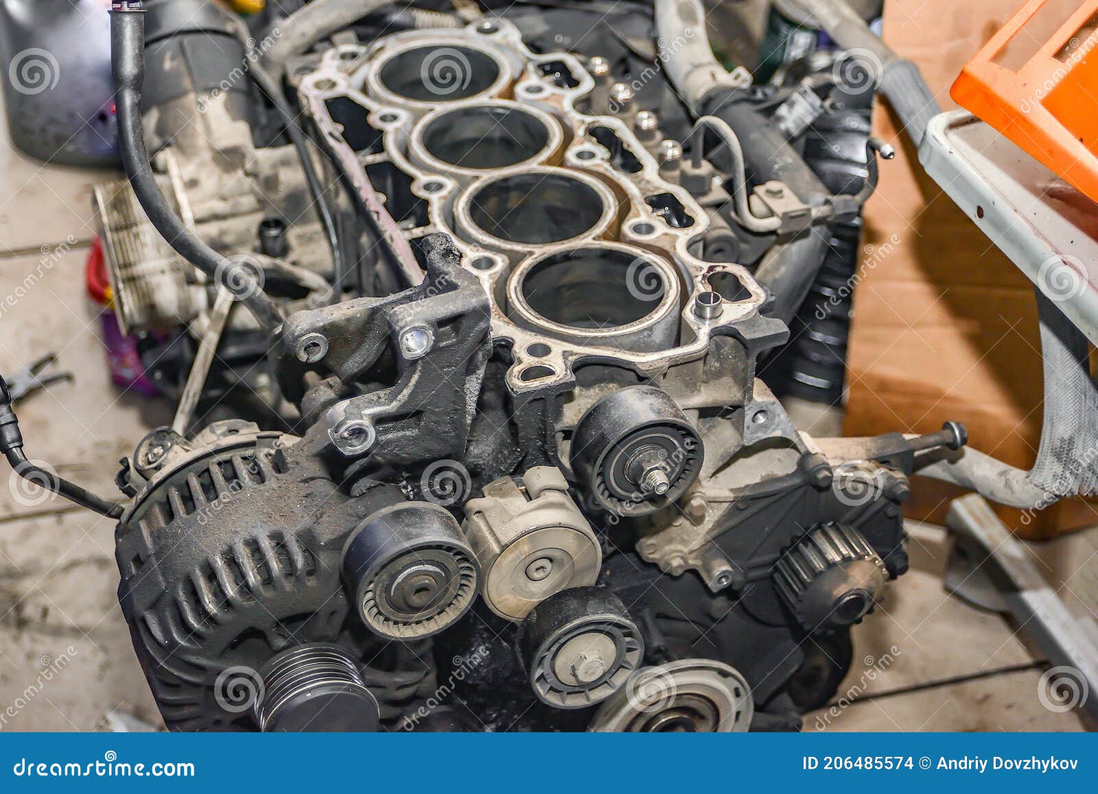 Exploded View of a Four-cylinder Engine Block Being Repaired in a ...