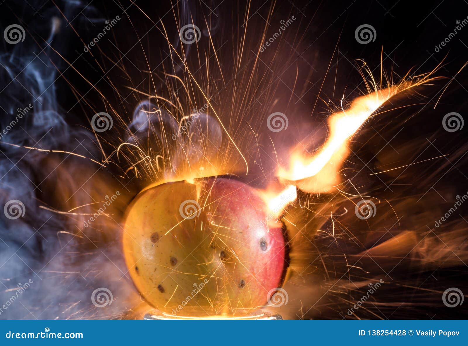 Exploding Apple with Flame, Sparks and Smoke Stock Photo - Image of ...