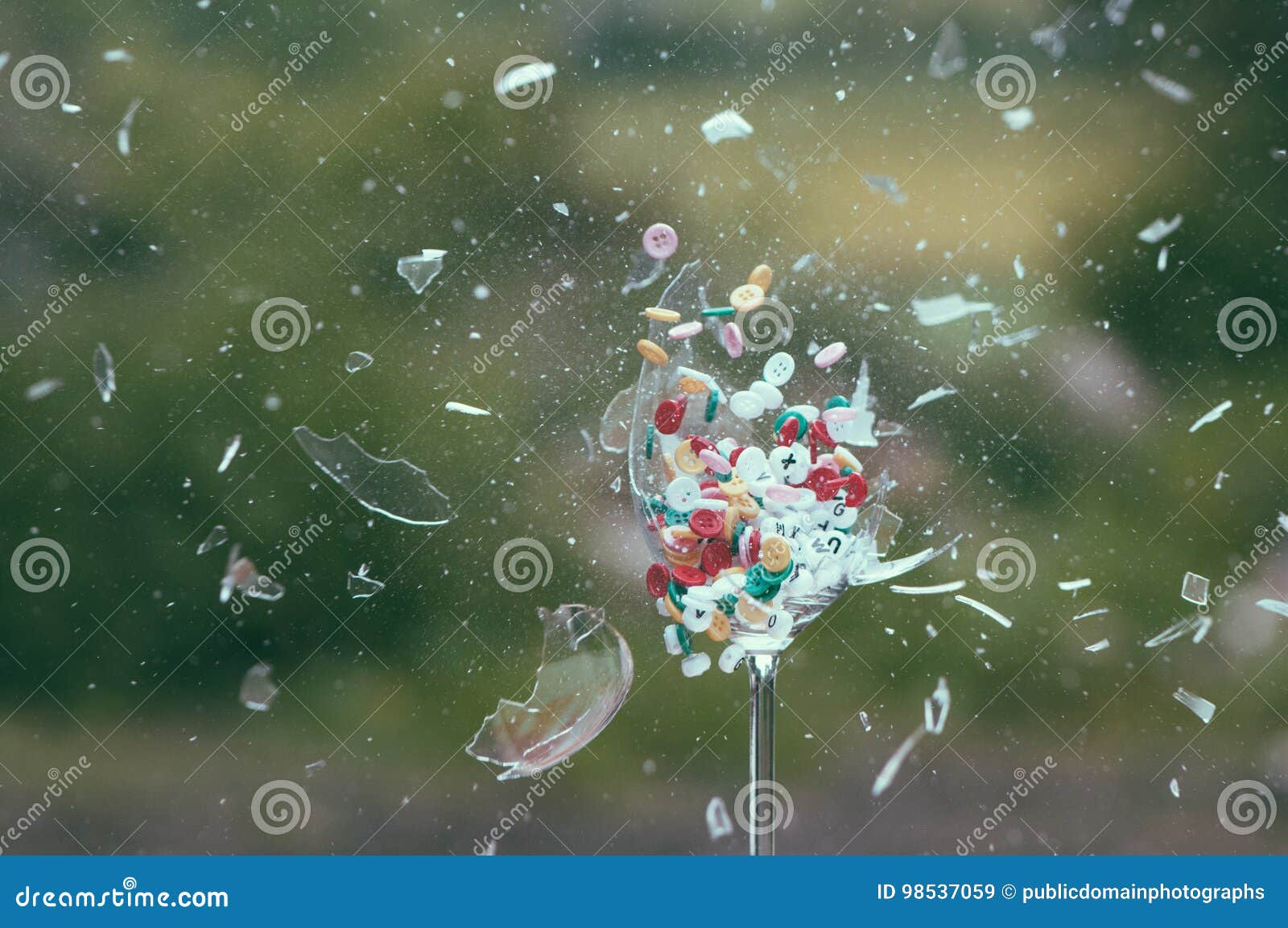Exploding Glass With Colored Buttons Picture. Image: 98537059