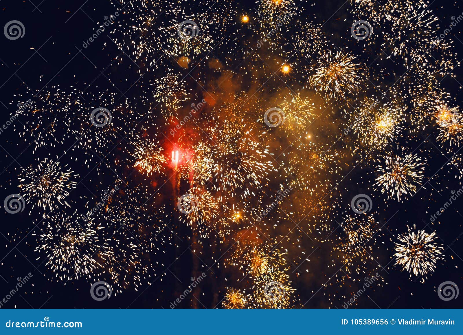 Exploding Golden Bright Fireworks Against a Night Sky Stock Photo ...
