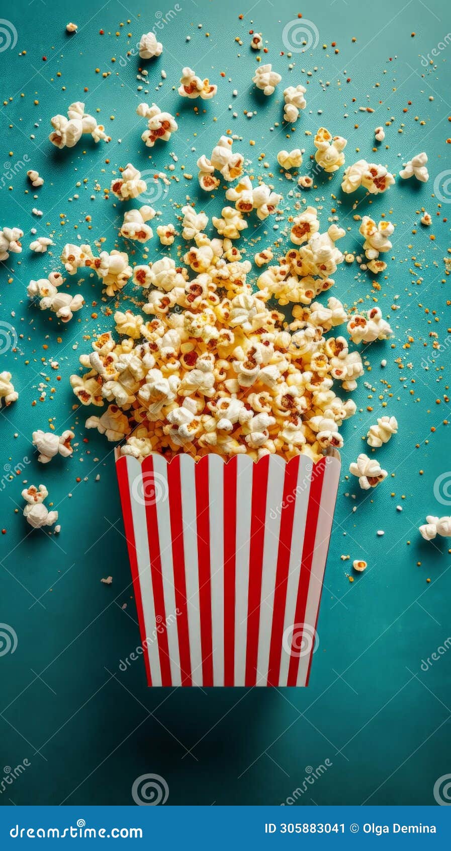 Exploding Red Popcorn Box on a Teal, Kernels Mid-air Create a Sense of ...