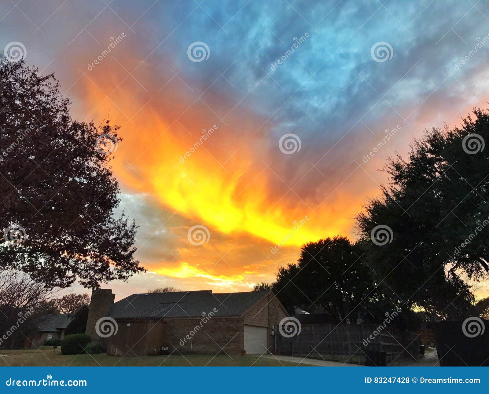 Exploding Sunset stock photo. Image of colorful, house - 83247428