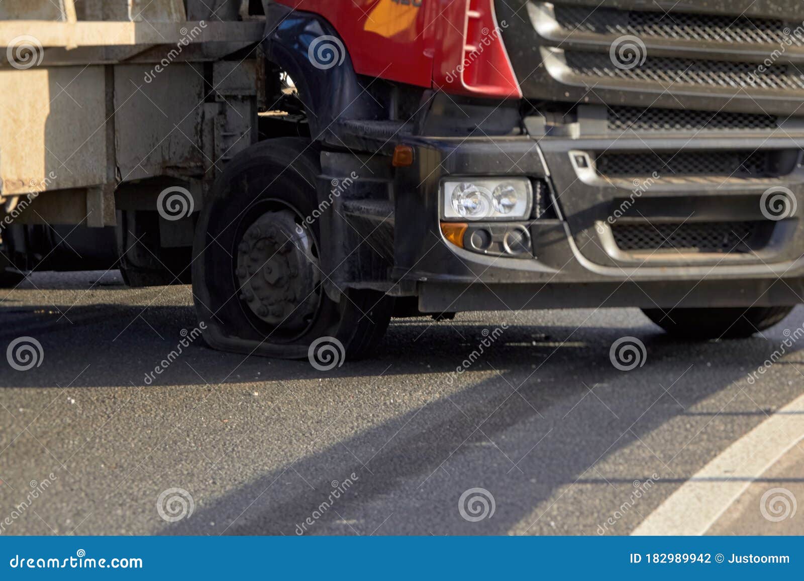 An Exploding Truck Wheel Caused an Accident on the Road Stock Photo ...