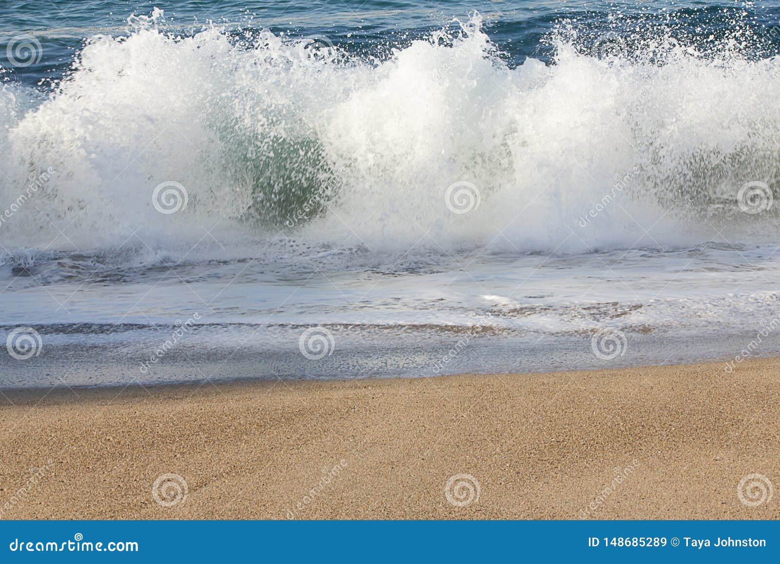 Exploding Wave Splash with Foaming Backsplash on Sandy Beach Stock ...