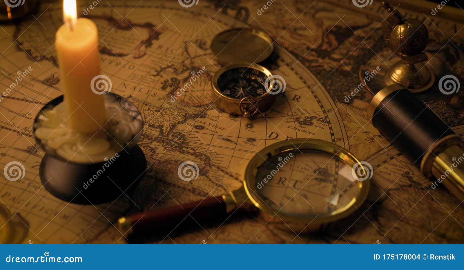 Exploration Concept - Antique Objects on Old World Map in Candlelight ...