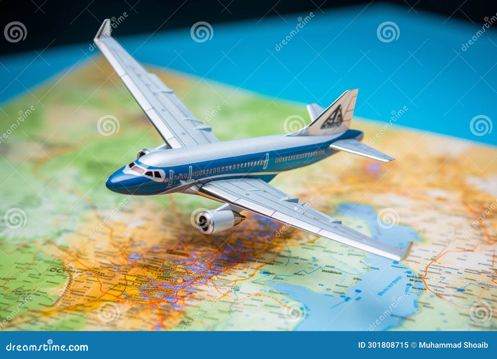 Exploration Theme Close Up of a Map with a Model Airplane Stock ...