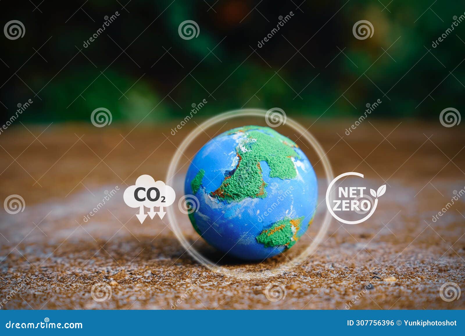 Explore a Small World Globe Symbolizing CO2 Reduction and Net Zero ...