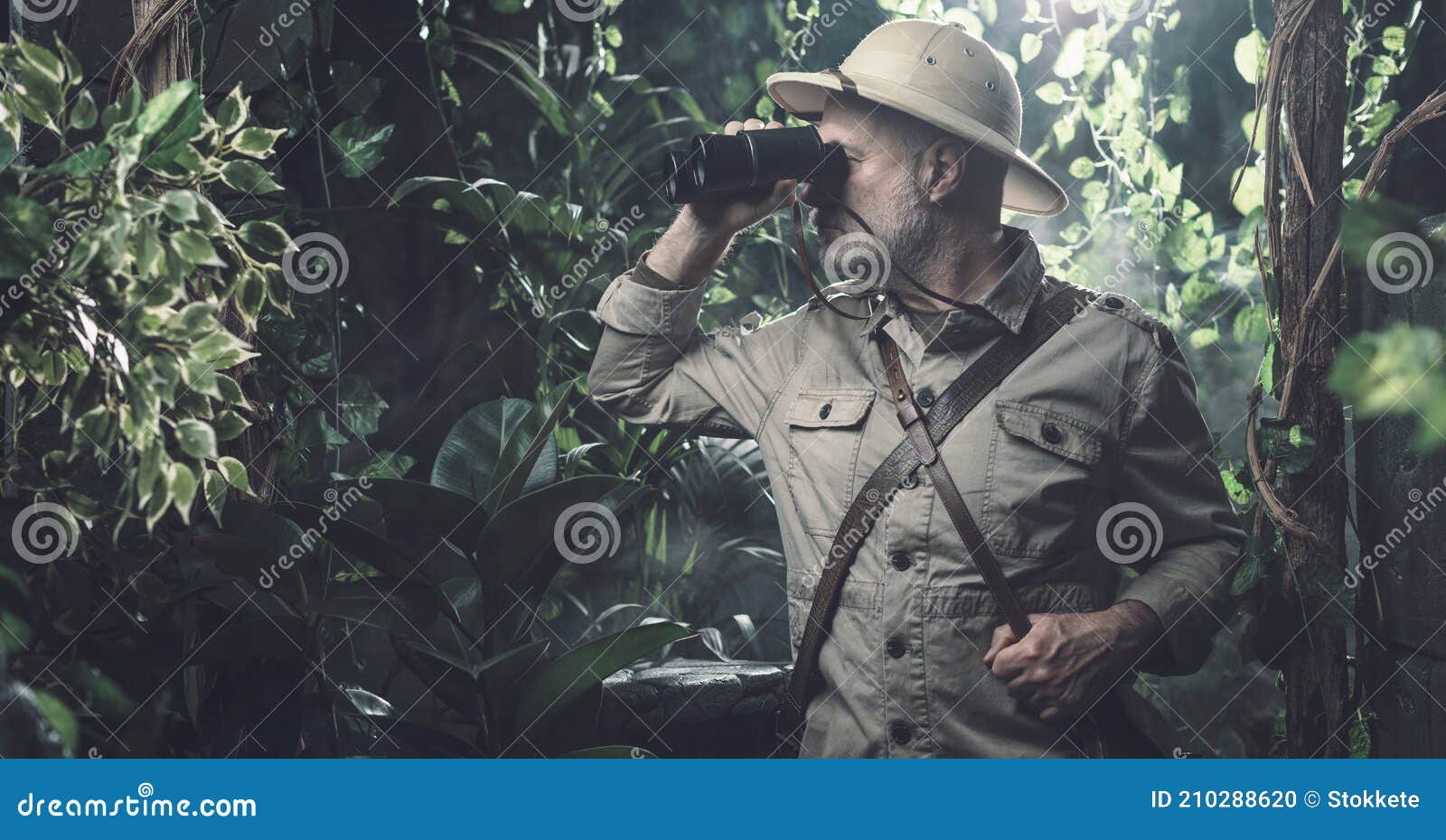 Explorer with Binoculars in the Jungle Stock Photo - Image of ...