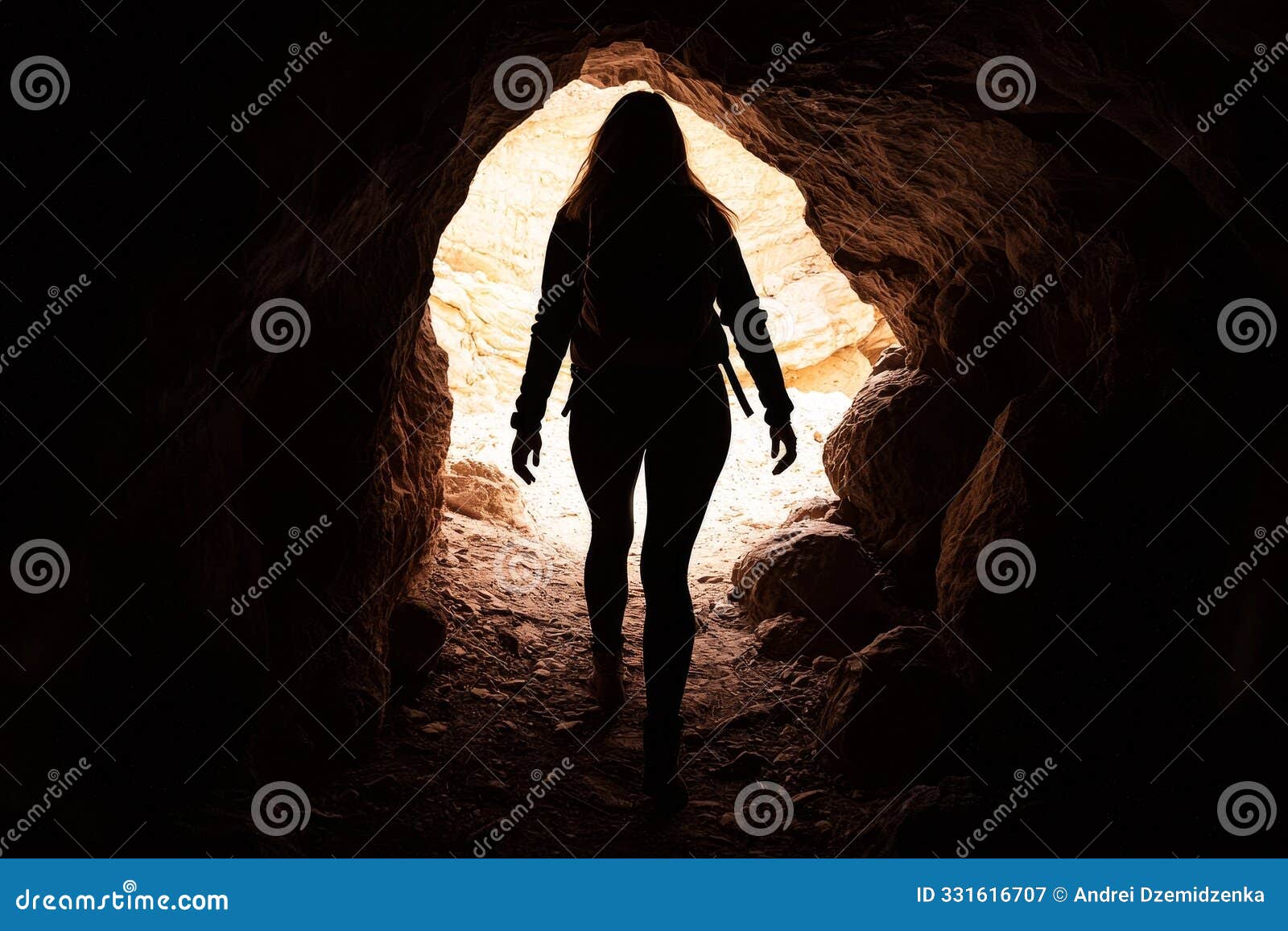 An Explorer Inside a Cave Next To the Ocean in Silhouette Stock ...