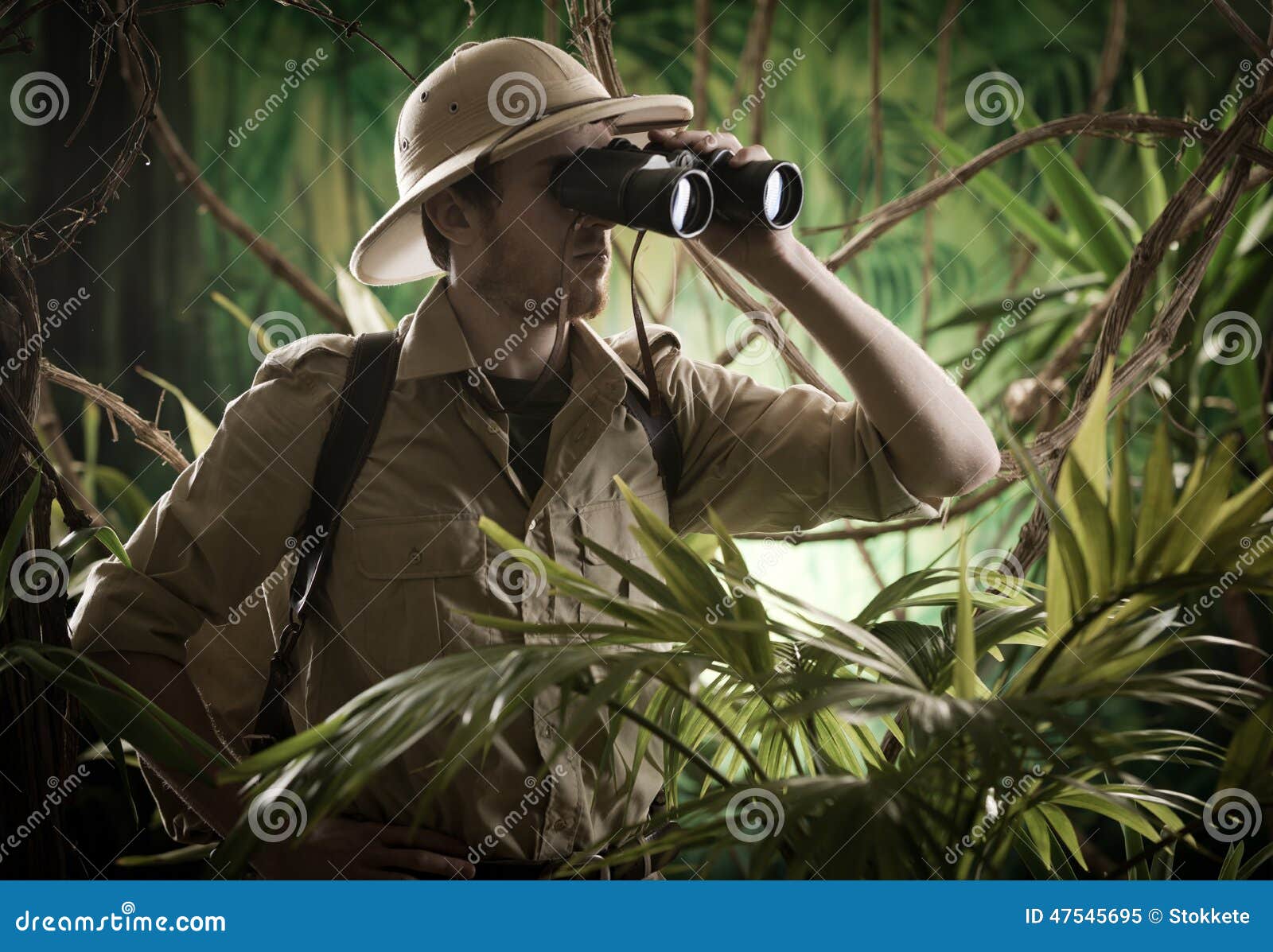 Explorer in the Jungle with Binoculars Stock Image - Image of ...