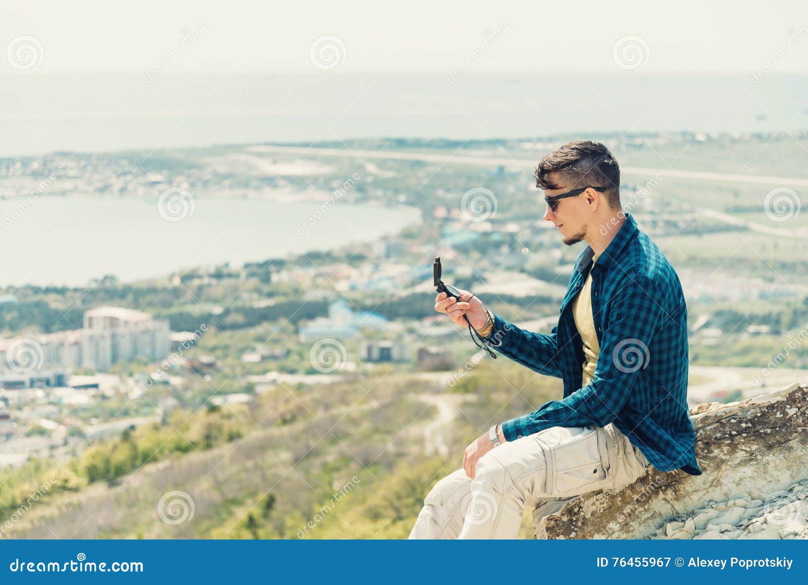 Explorer man with compass stock image. Image of nature - 76455967