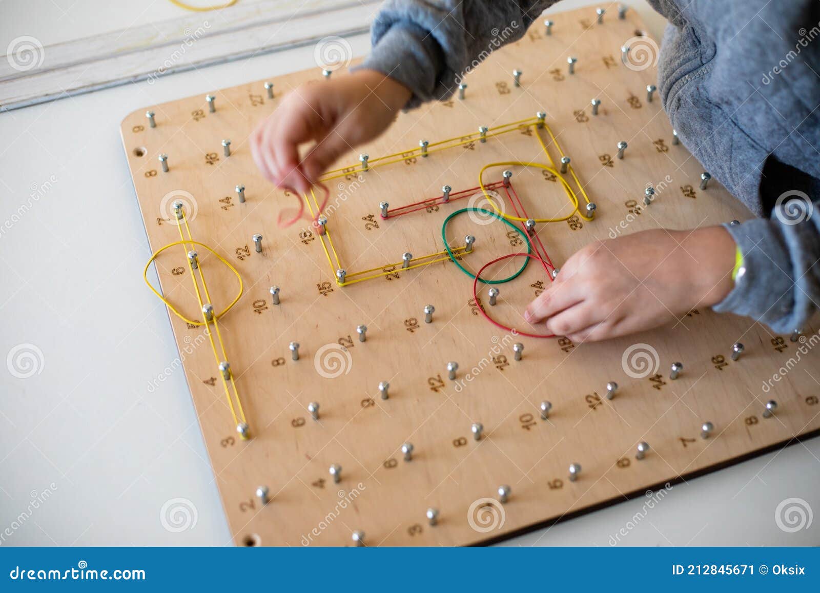 Exploring Basic Math and Geometry Concepts with Geoboard Stock Image ...