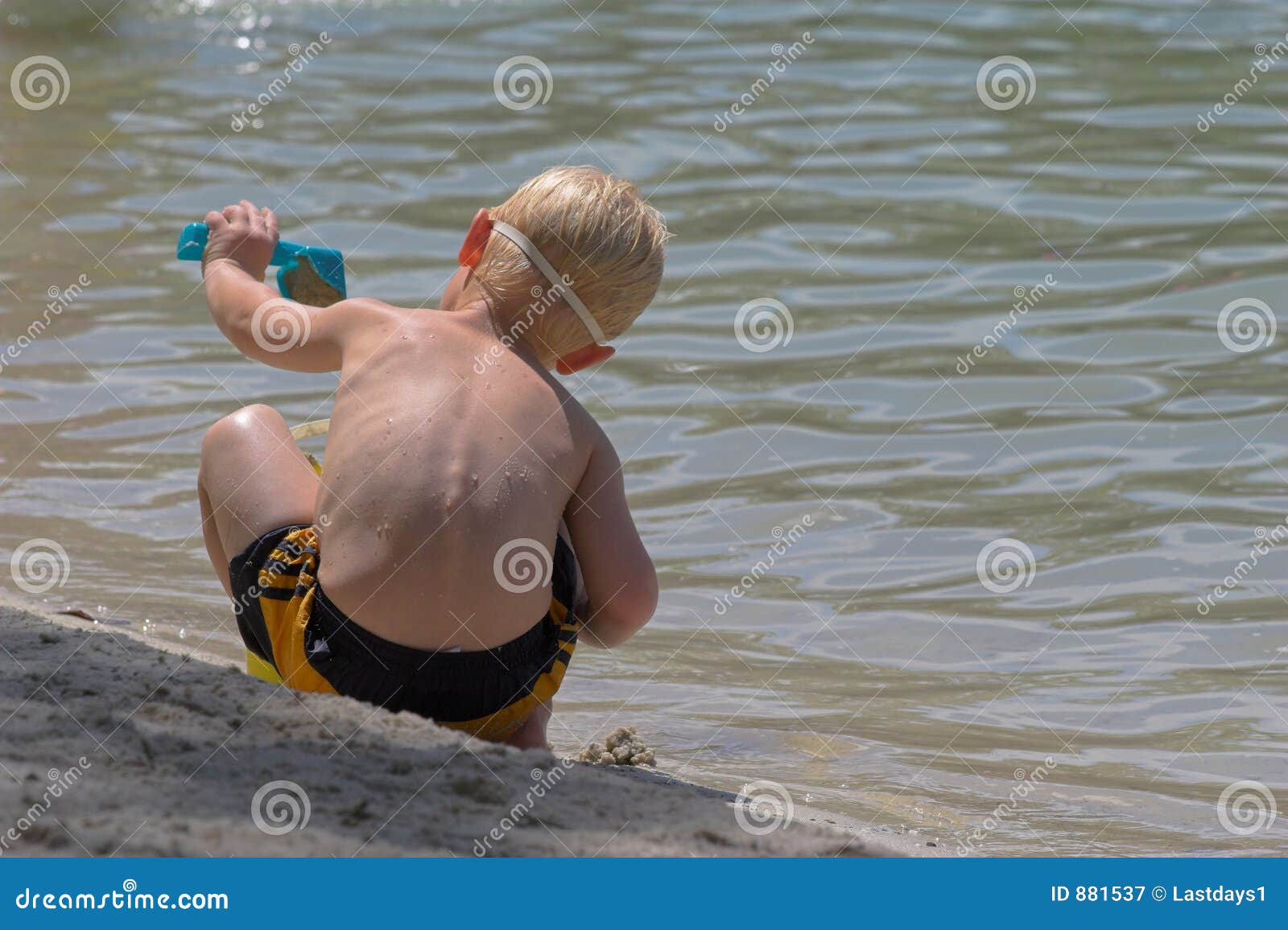 Exploring beach stock image. Image of float, young, pail - 881537
